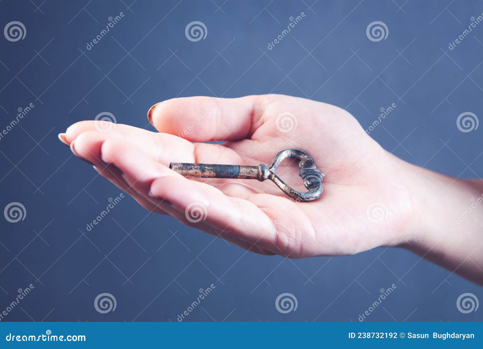 Female Hand Holding an Old Vintage Key Stock Photo - Image of business ...
