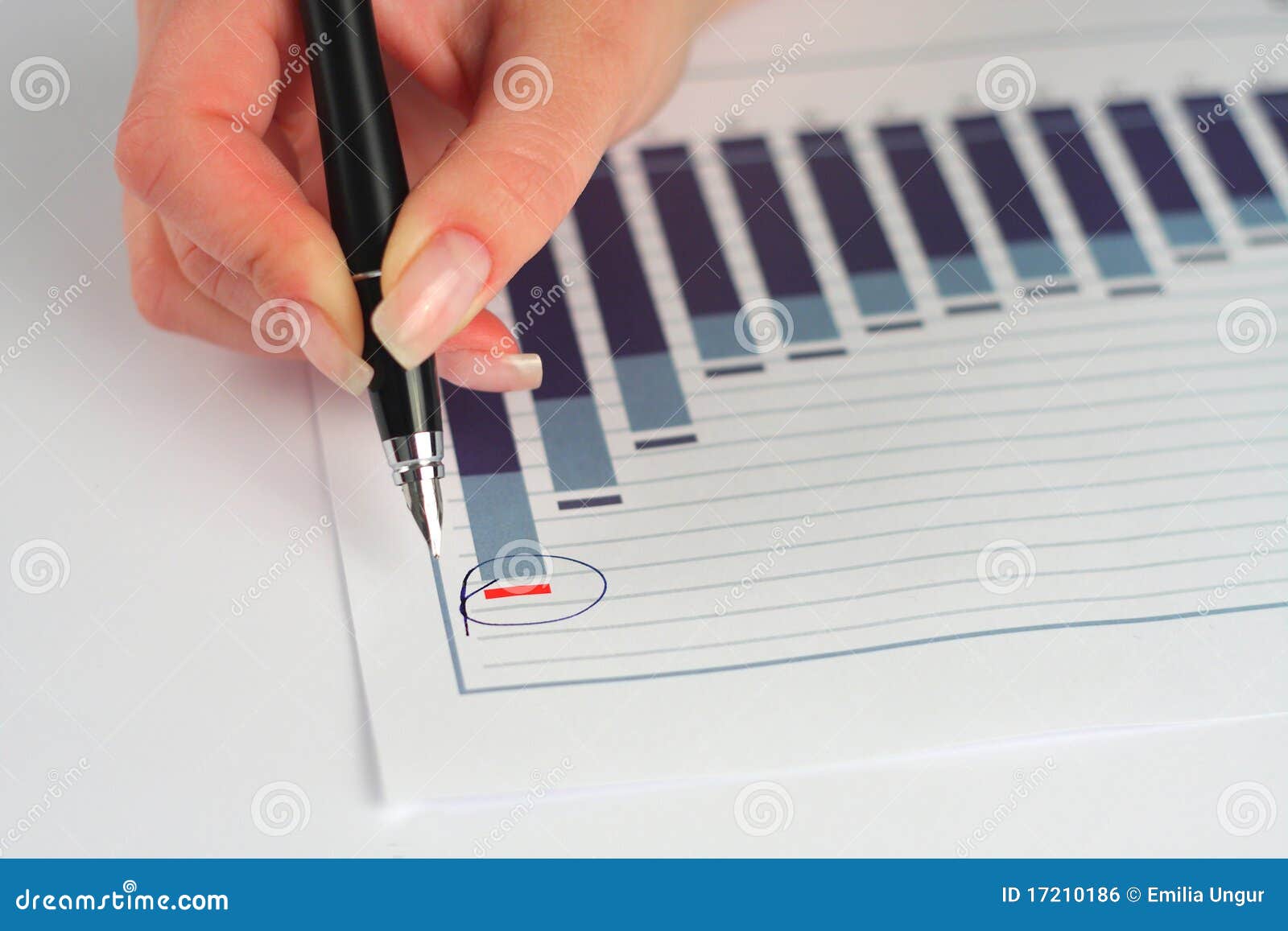 Female Hand Holding Pen Over Business Graph Stock Photo - Image of ...