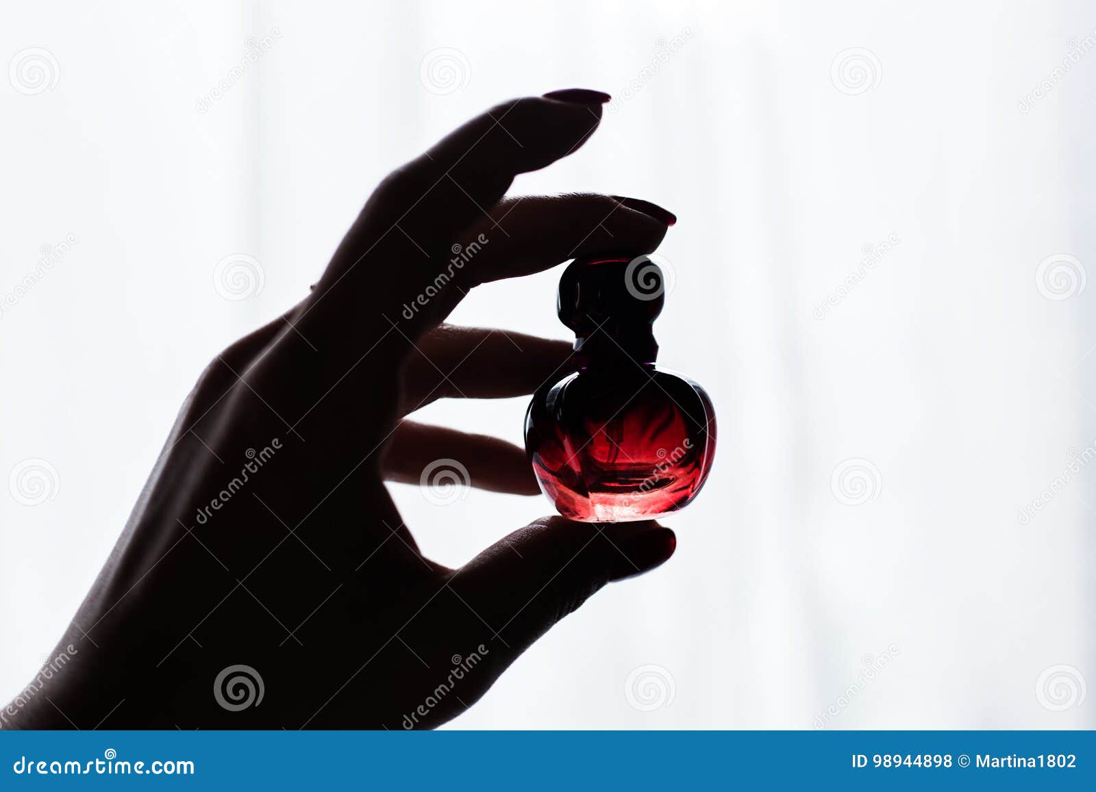 Female Hand Holding Perfume Bottle Stock Photo - Image of lady, female ... Female Hand Holding Perfume Bottle Stock Photo - Image of lady, female ...
