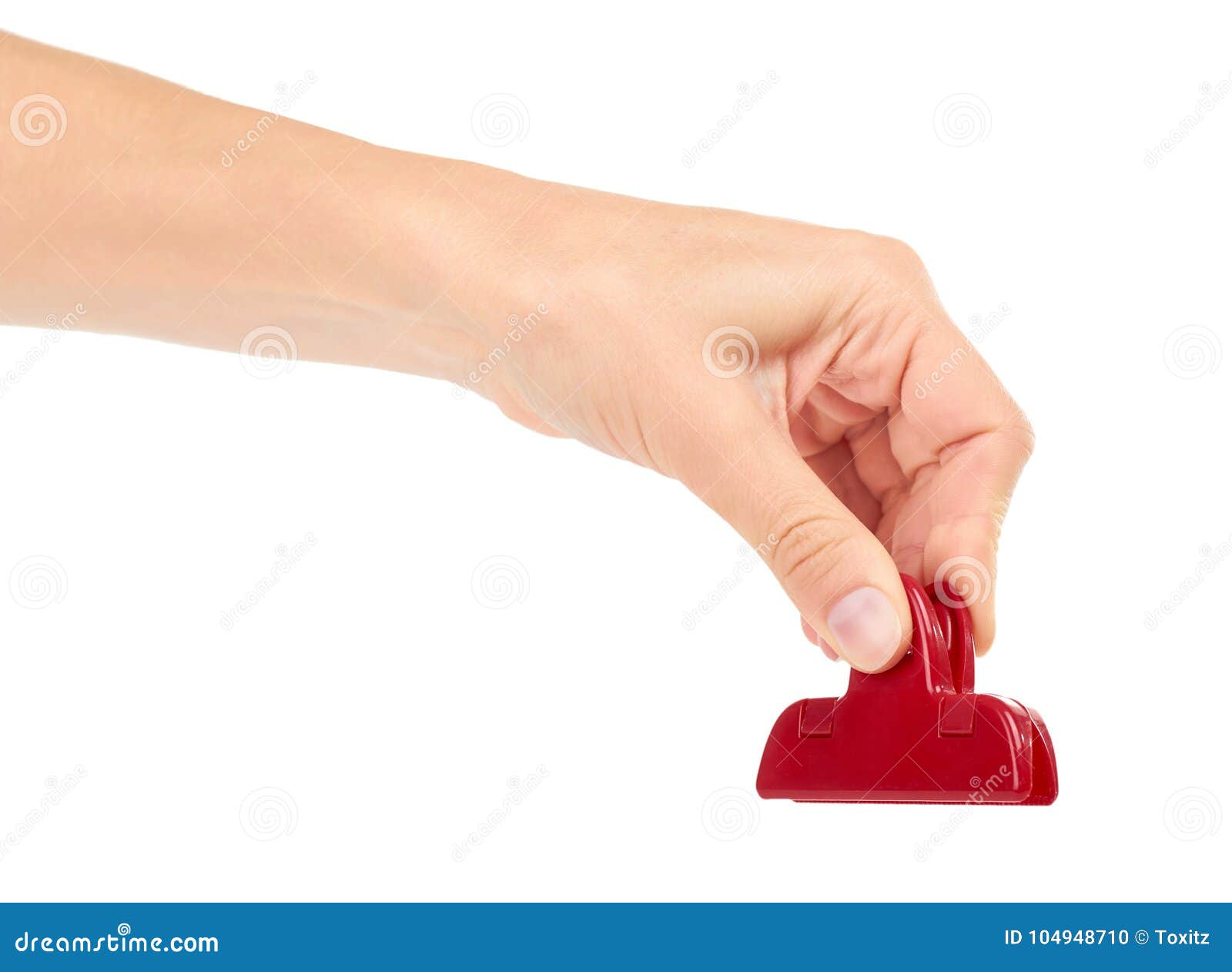 Female Hand Holding Red Plastic Clamp. Isolated on White Background ...