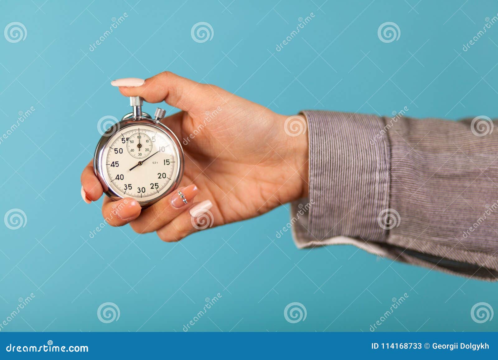 Female Hand Holding a Stopwatch Stock Image - Image of clock ...