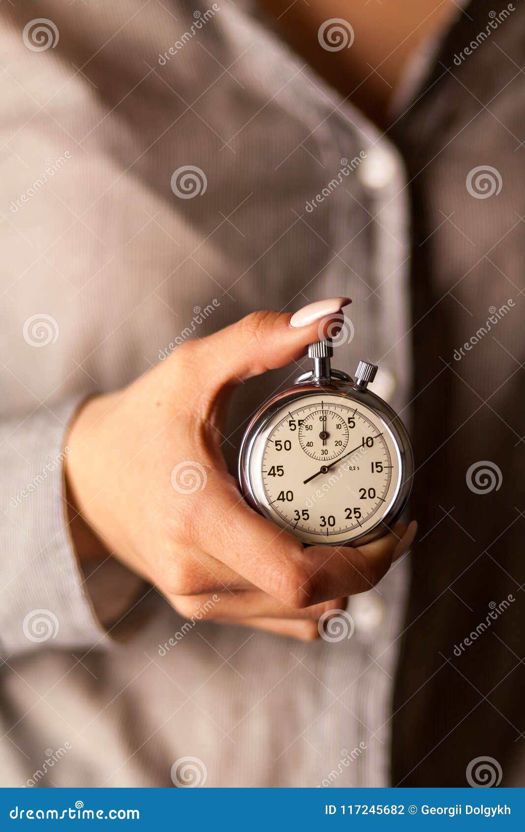 Female Hand Holding a Stopwatch Stock Photo - Image of sport, hand ...