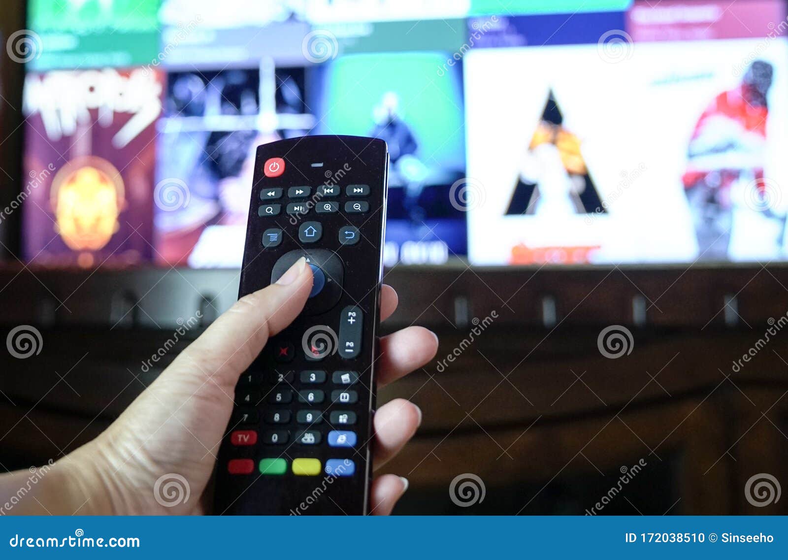 Female Hand Holding a Smart Tv Remote Control Stock Photo - Image of ...