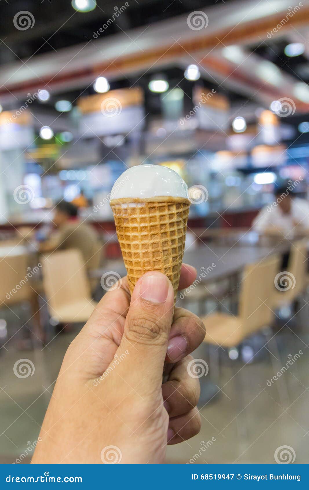 Female Hand Holding Vanilla Ice Cream Stock Image - Image of bokeh ...