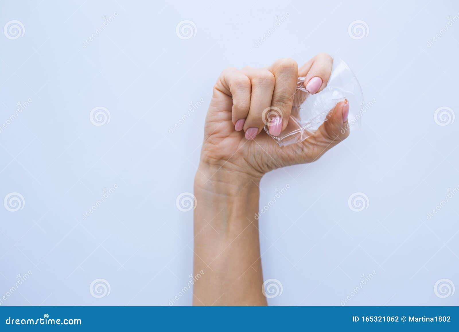 Hand Holds a Plastic Glass. Plastic Pollution Stock Photo - Image of ...