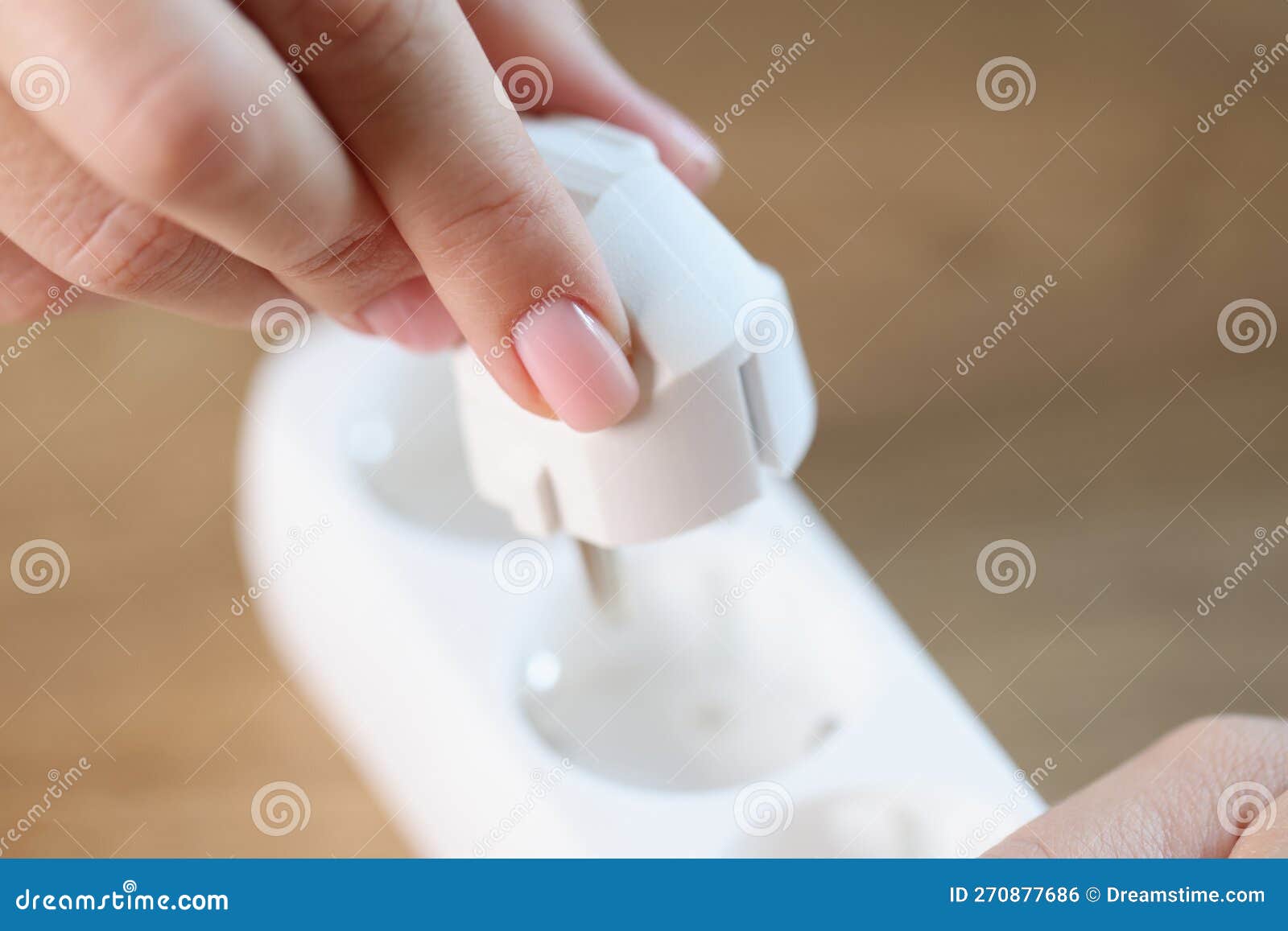 Female Hand Inserting Electric Plug into White Socket Stock Photo ...