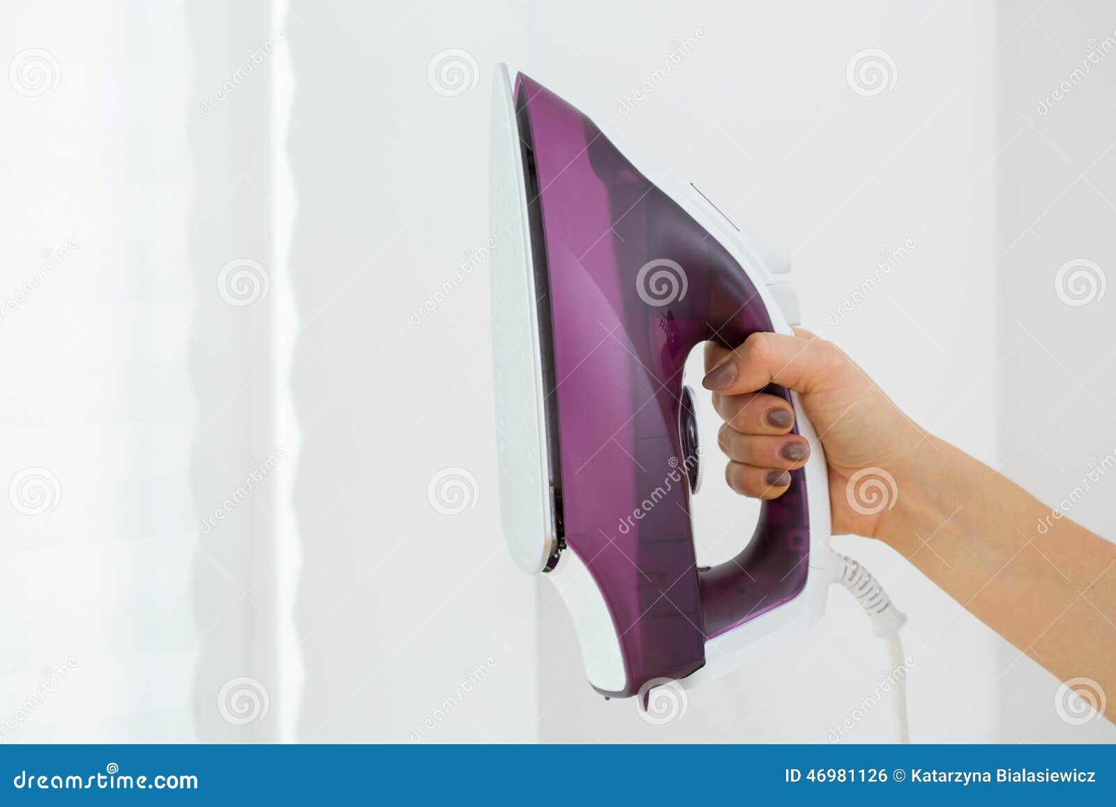 Female hand with iron stock photo. Image of active, housework - 46981126