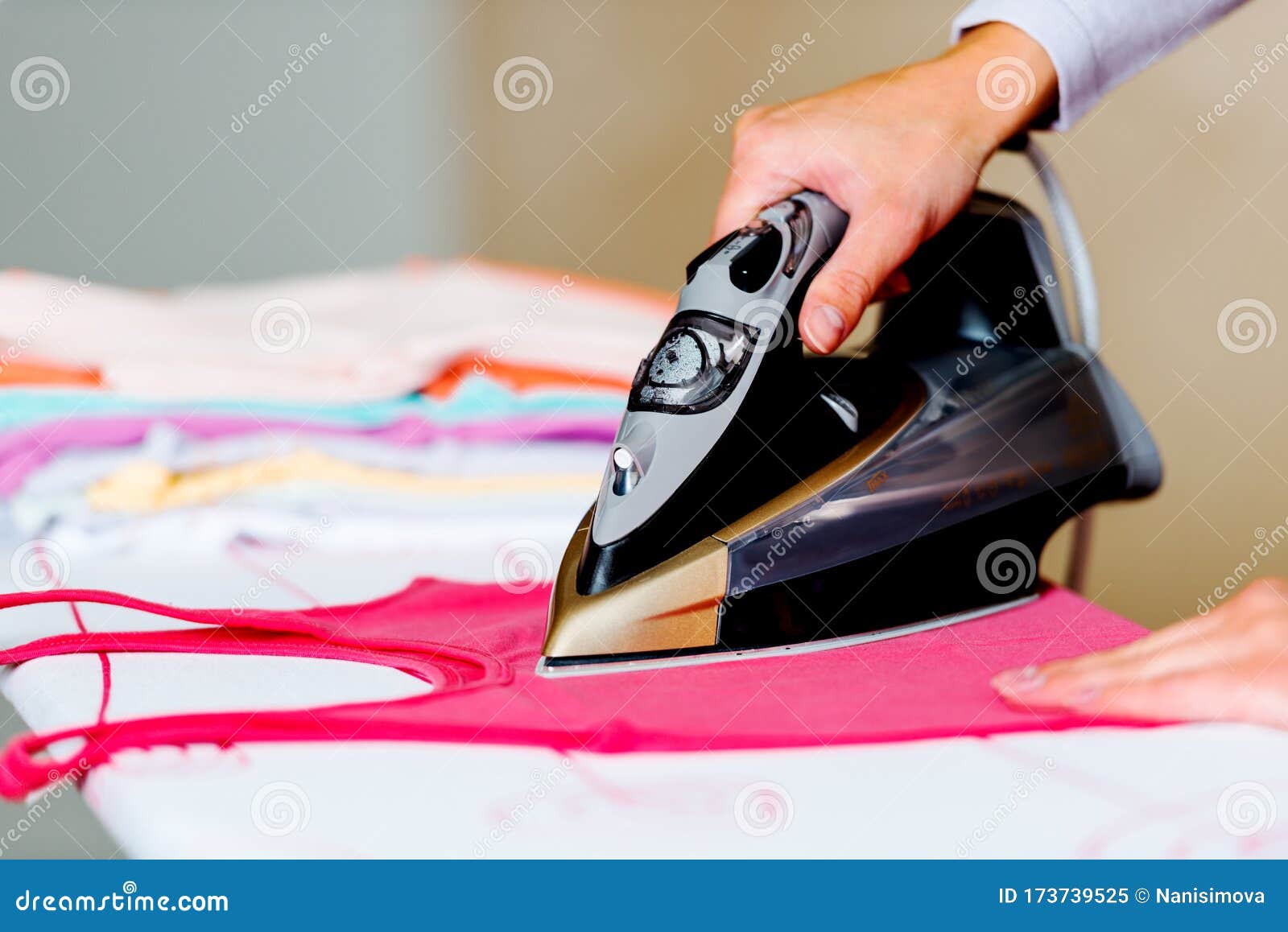 Female Hand Ironing Clothes on Board Stock Image - Image of electric ...