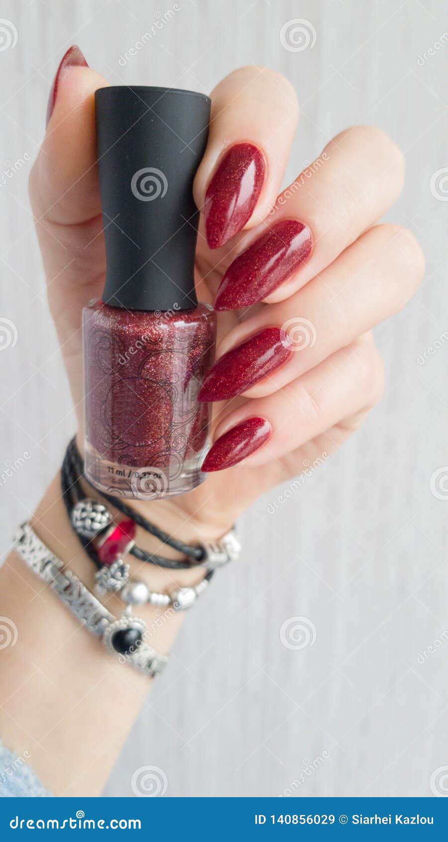 Female Hand With Red Long Nails And A Bottle Stock Image Image Of