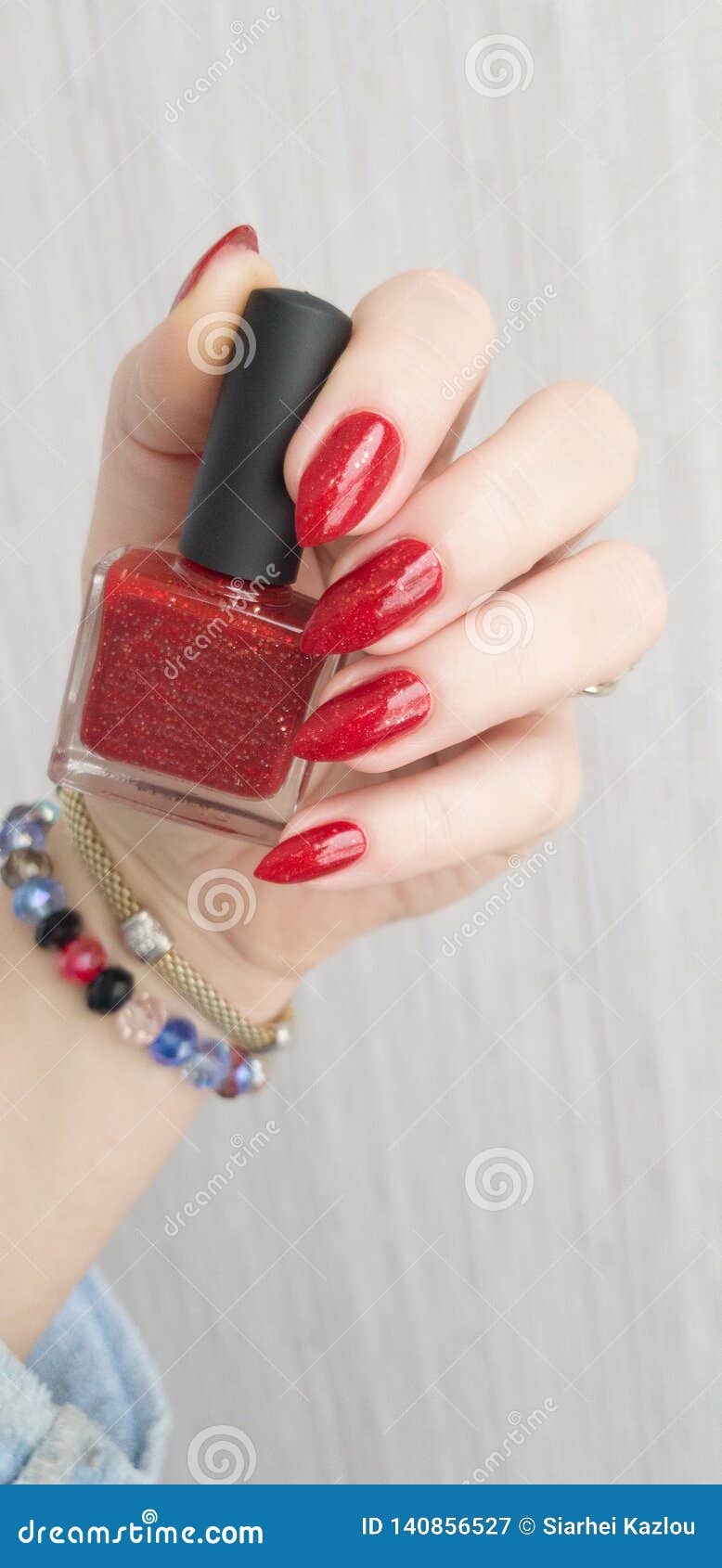 Female Hand With Red Long Nails And A Bottle Stock Image Image Of