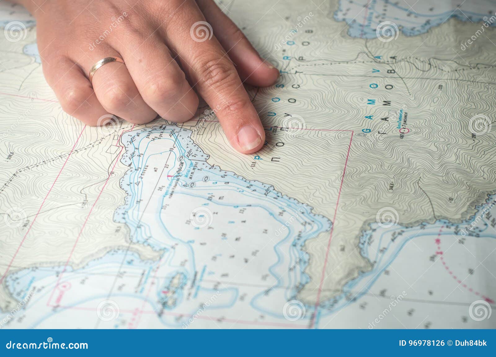 Female hand on the map stock photo. Image of country - 96978126