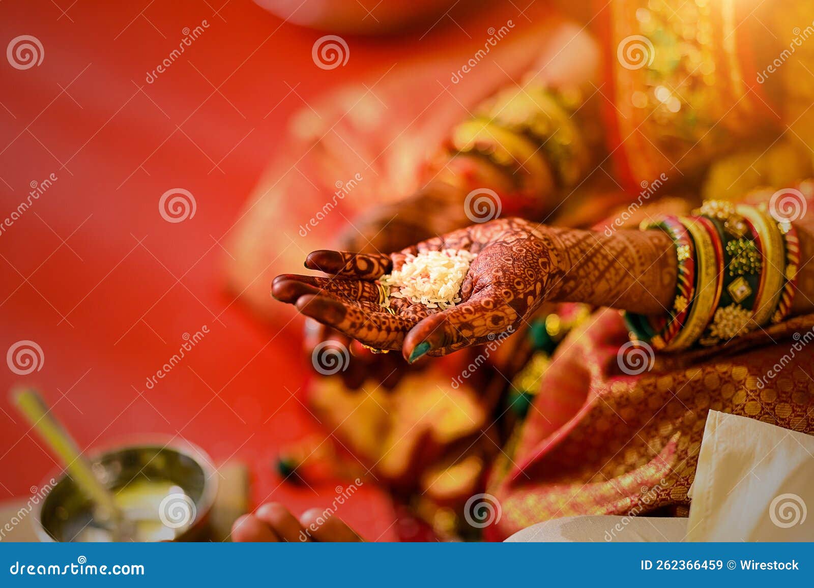 Female Hand with Mehndi and Bangles Holding Rice Stock Image - Image of ...