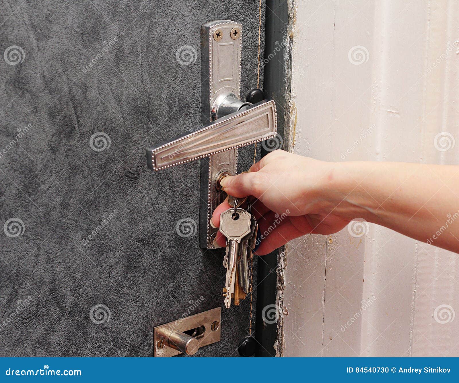 Female Hand Opens the Door with a Key. Stock Photo - Image of owner ...