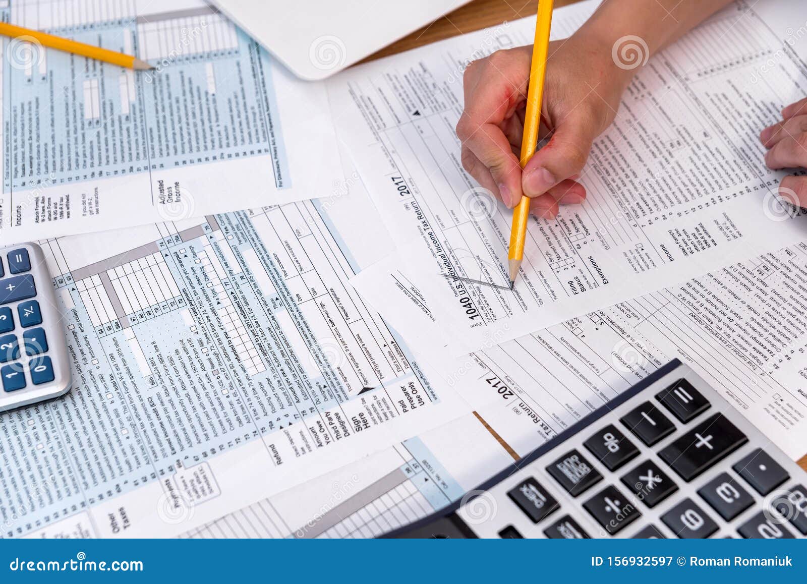 Female Hand with Pencil Filling 1040 Form Editorial Photography - Image ...