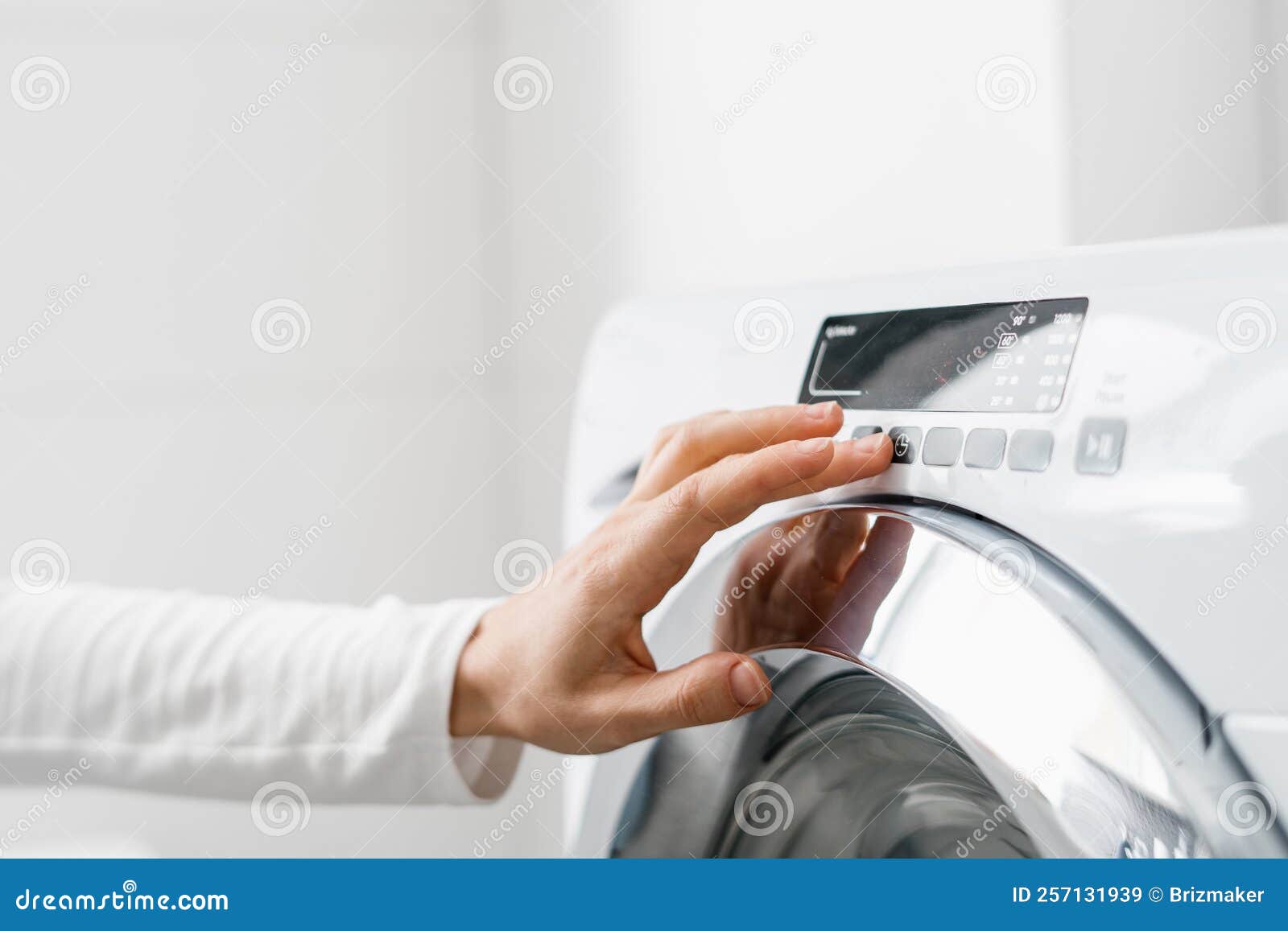 Female Hand Press Button on Washing Machine Indoors Stock Image - Image ...