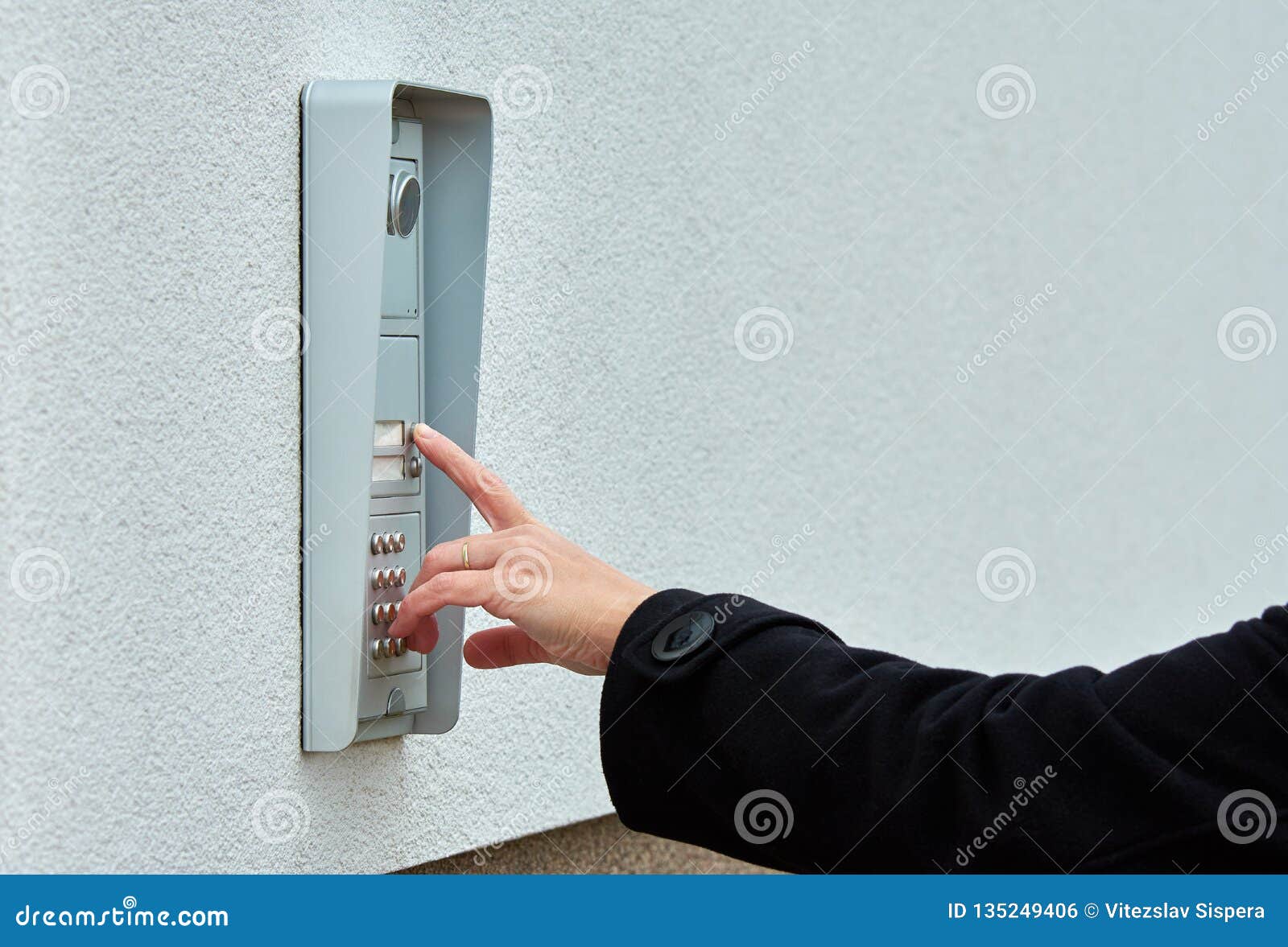 The Female Hand Presses a Button Doorbell with Intercom Stock Photo ...