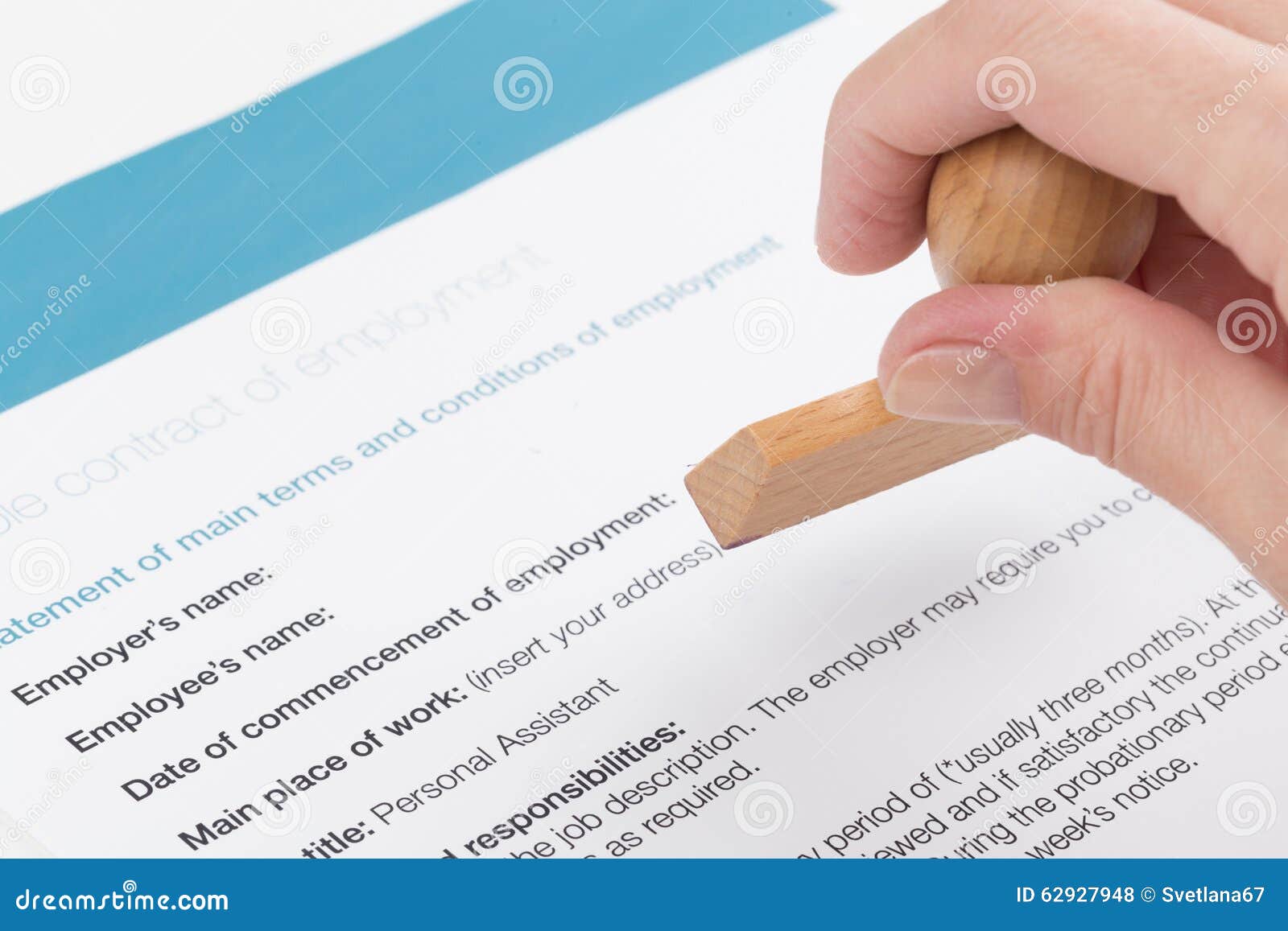 Female hand puts a stamp stock photo. Image of sign, papers - 62927948