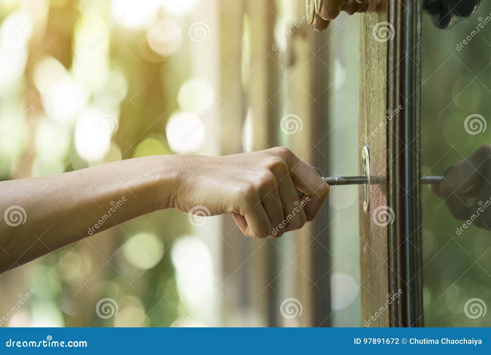Female Hand Putting House Key into Front Door Stock Photo - Image of ...