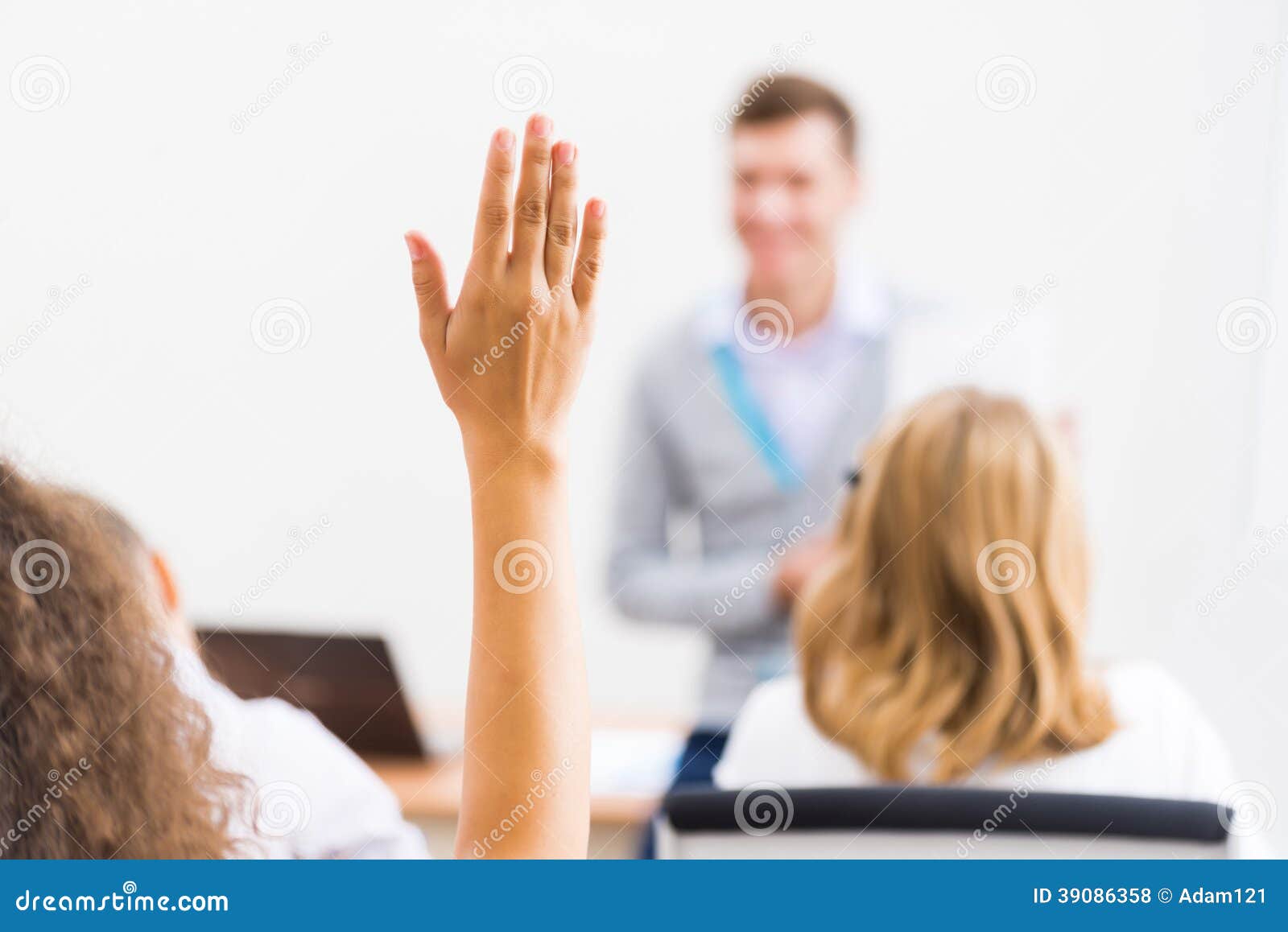 Female Hand Raised in Class Stock Photo - Image of class, attention ...