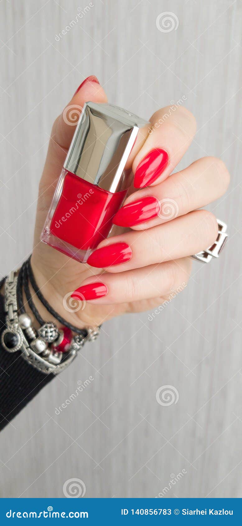 Female Hand With Red Long Nails And A Bottle Stock Image Image Of
