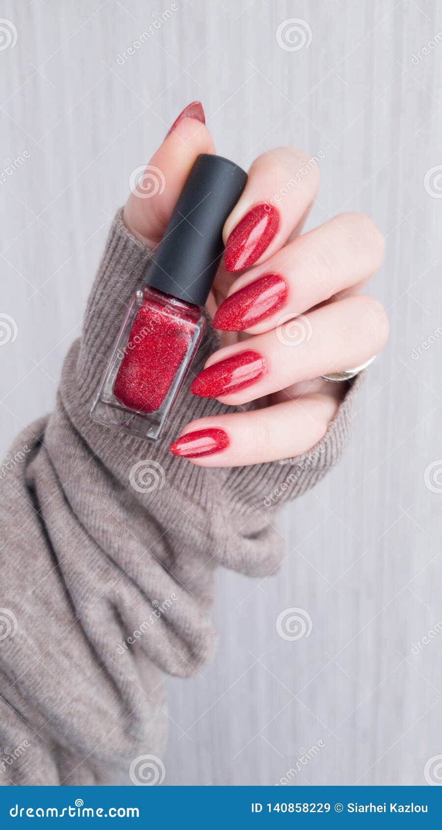 Female Hand With Red Long Nails And A Bottle Stock Image Image Of
