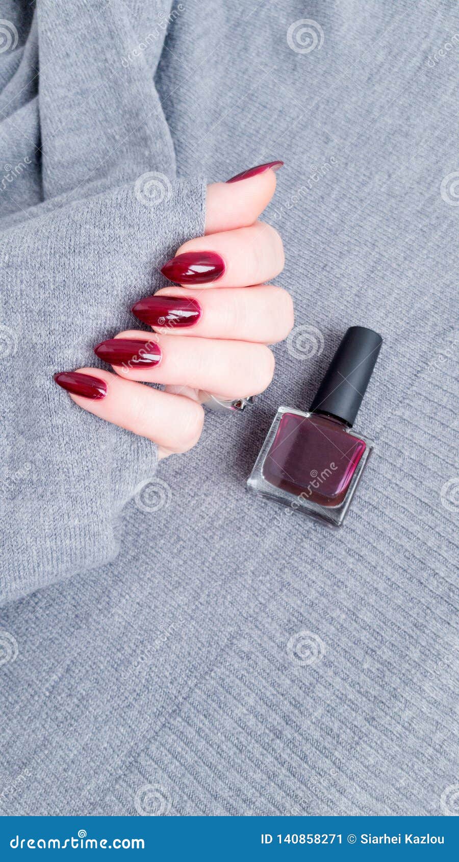 Female Hand With Red Long Nails And A Bottle Stock Image Image Of