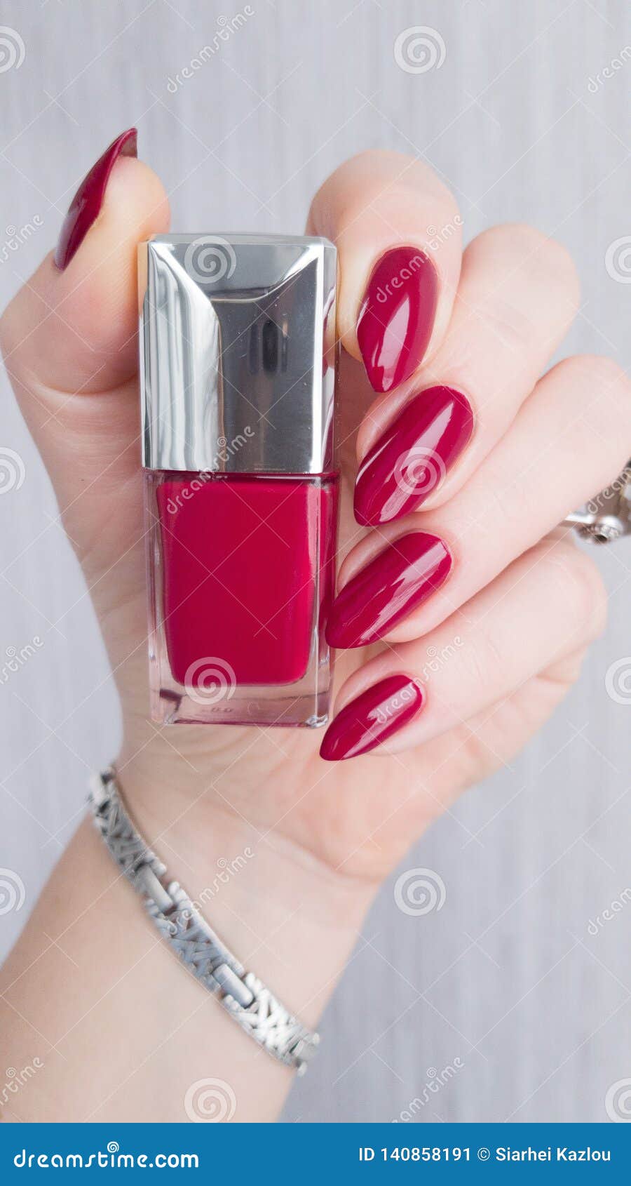Female Hand With Red Long Nails And A Bottle Stock Image Image Of