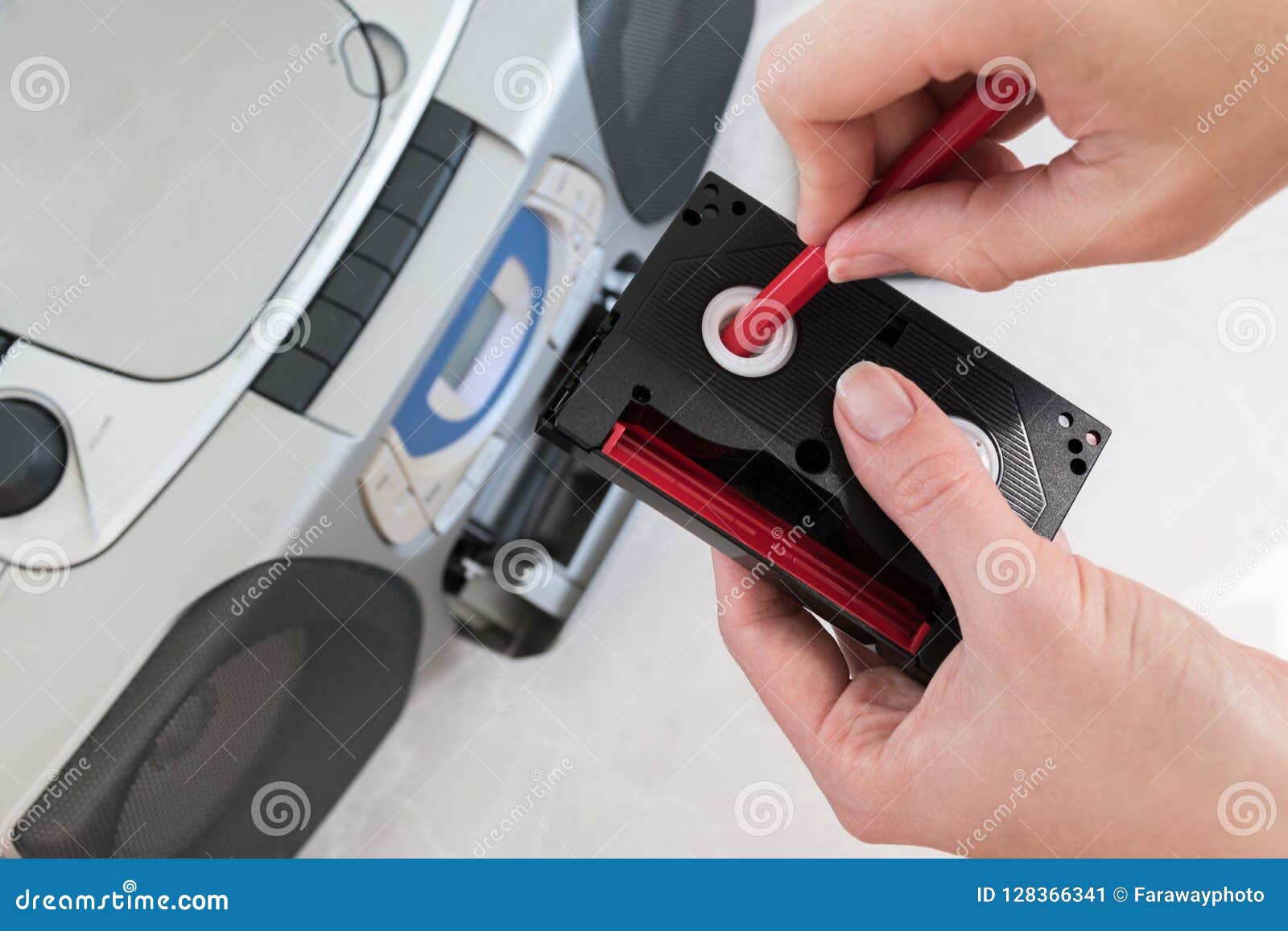 Female Hand Rewinding Cassette With A Red Pencil Stock Image Image Of Boom Record 128366341