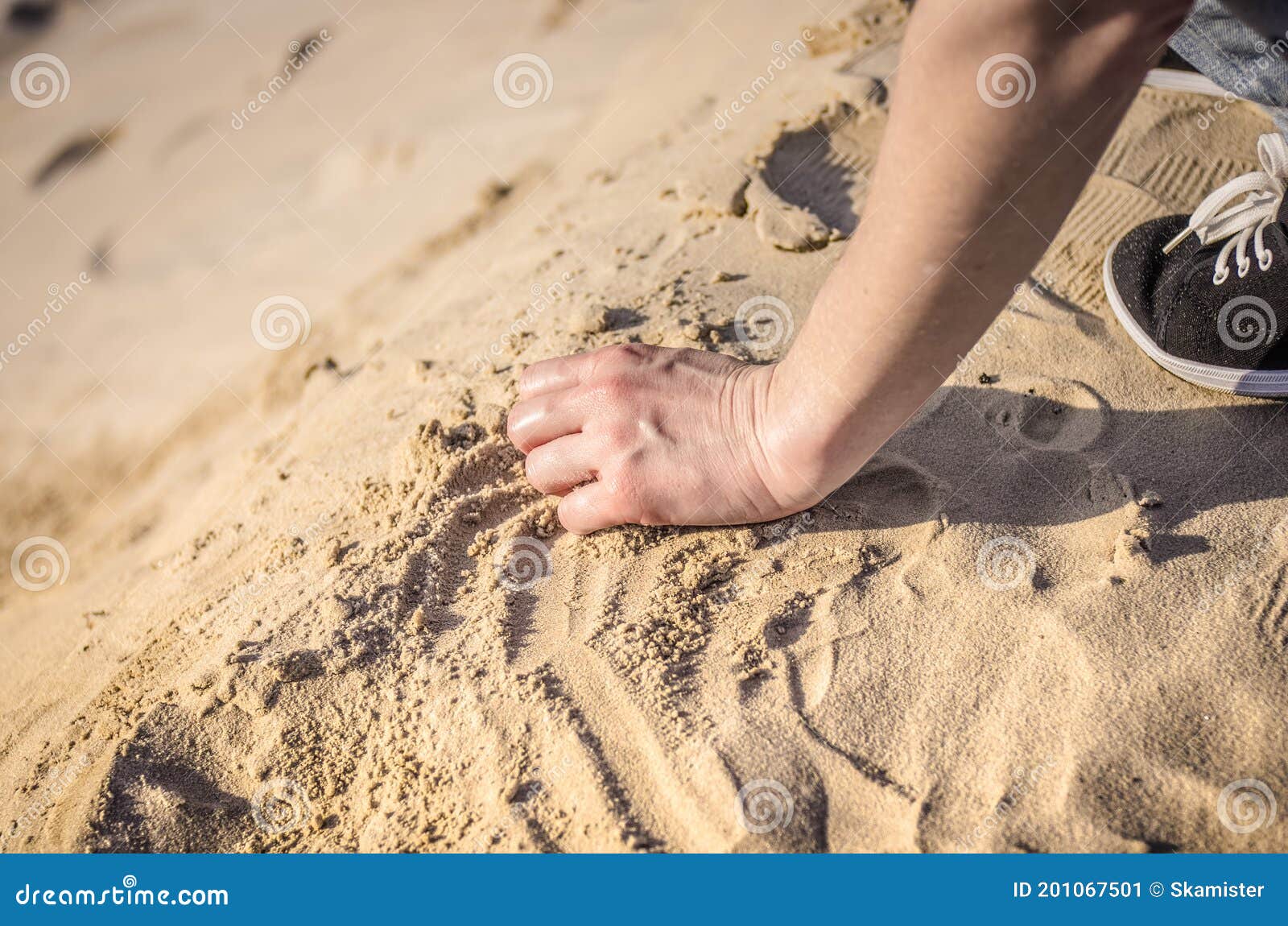 A Female Hand with Sand. Woman Pouring Sand Stock Image - Image of ...