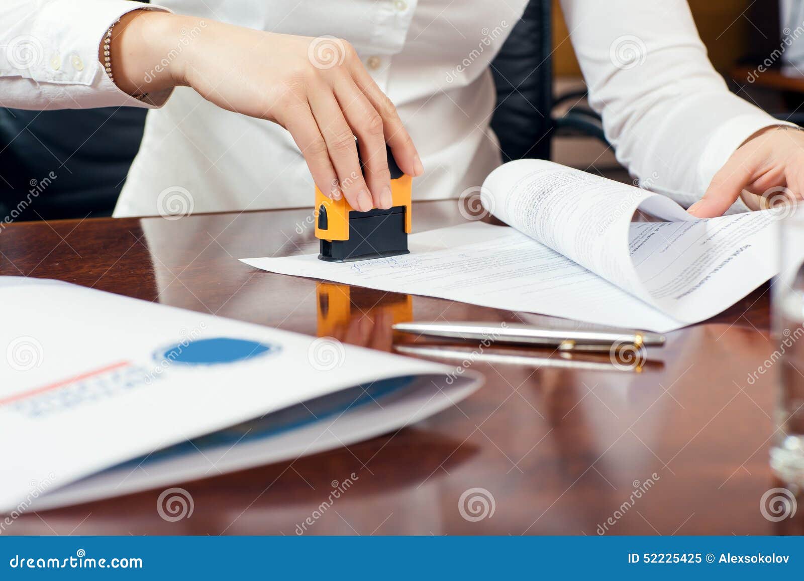 Female hand with stamp stock image. Image of certificate - 52225425