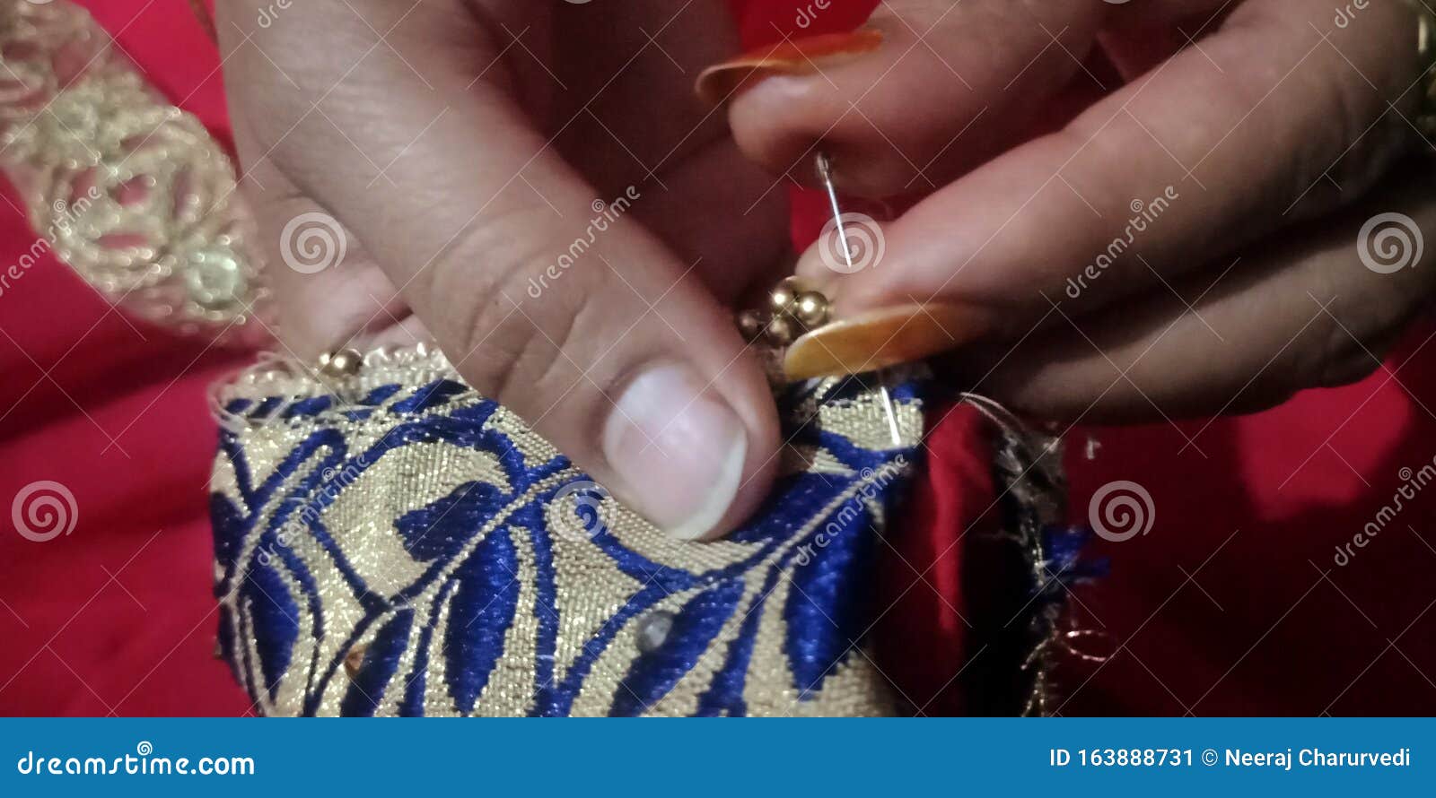 A Female Hand Sweing Cloth with Niddle Isolated Stock Image - Image of ...