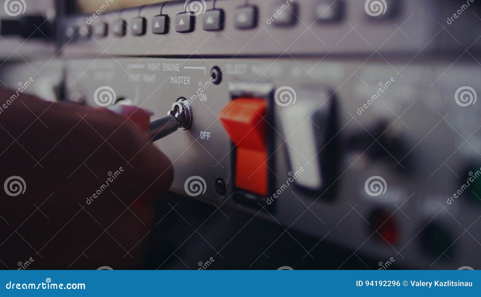 Female Hand Switch Toggle on Airplane Control Pane. Control Buttons ...