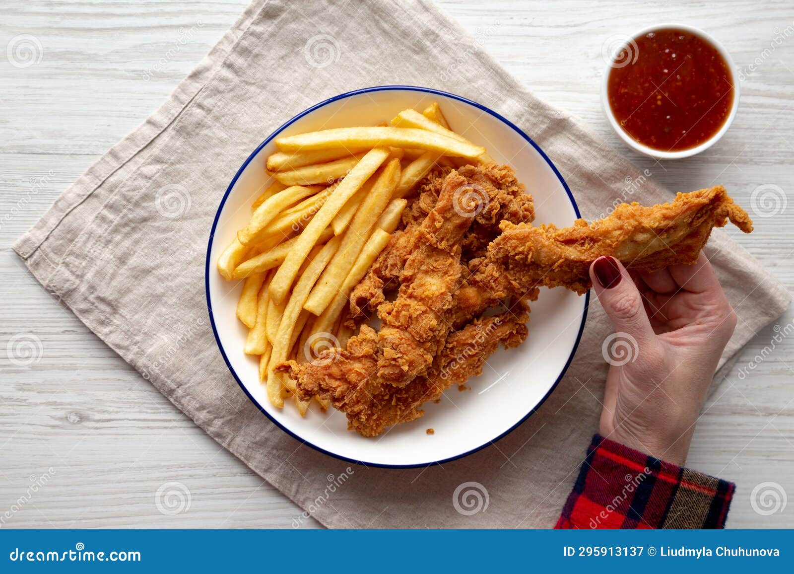 Female Hand Takes Crispy Chicken Strips, Top View Stock Image - Image ...