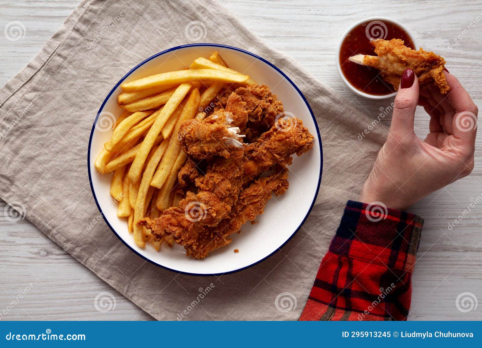 Female Hand Takes Crispy Chicken Strips, Top View Stock Image - Image ...