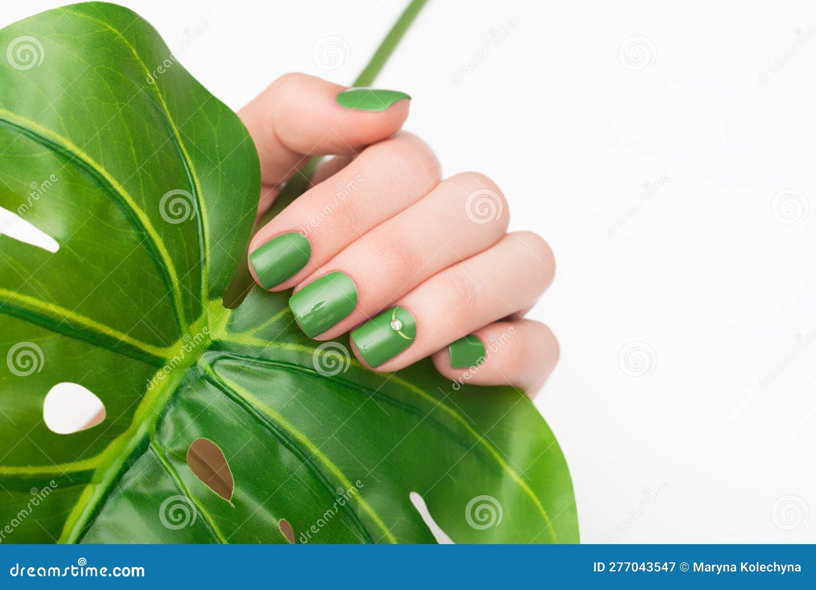 Female Hand With Tropic Nail Design Glitter Green Nail Polish Manicure