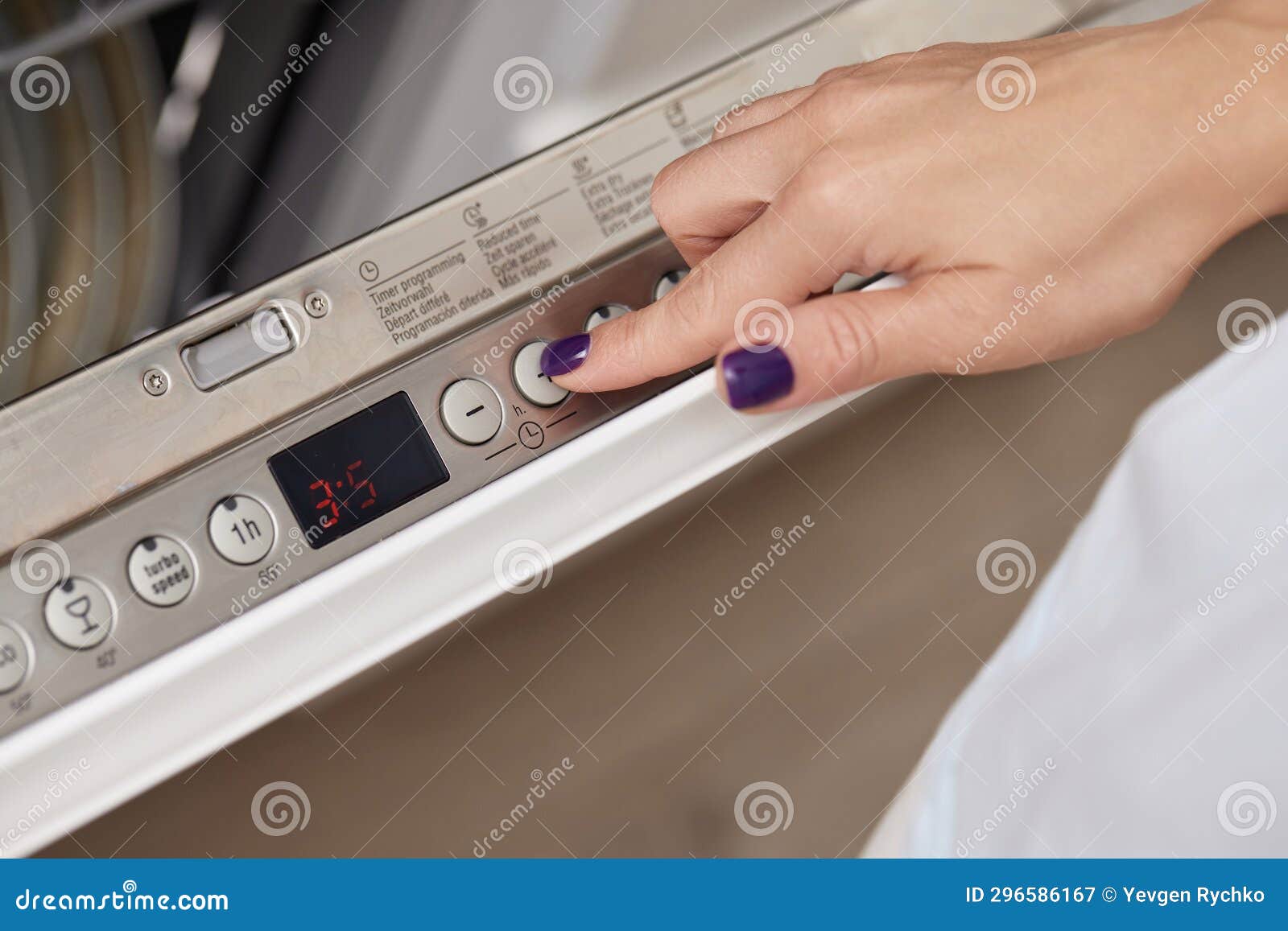 Female Hand Turning on Dishwasher Machine in Kitchen Stock Image ...