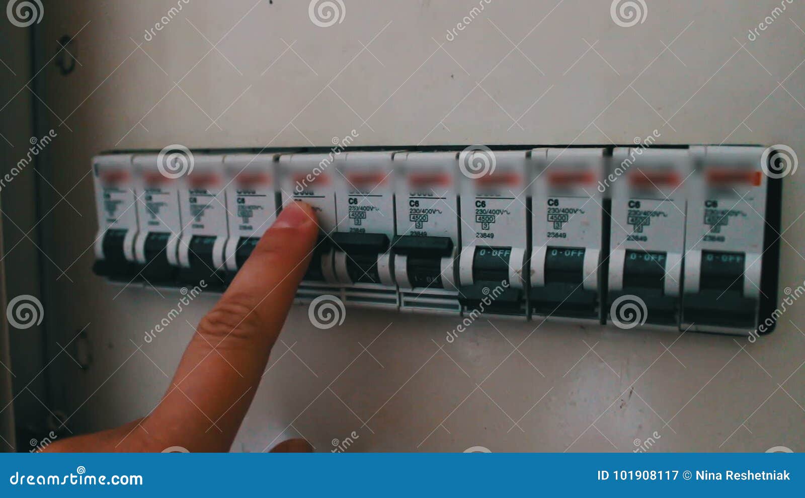 The Female Hand Turns on and Off the Toggle Switch on the Electrical ...