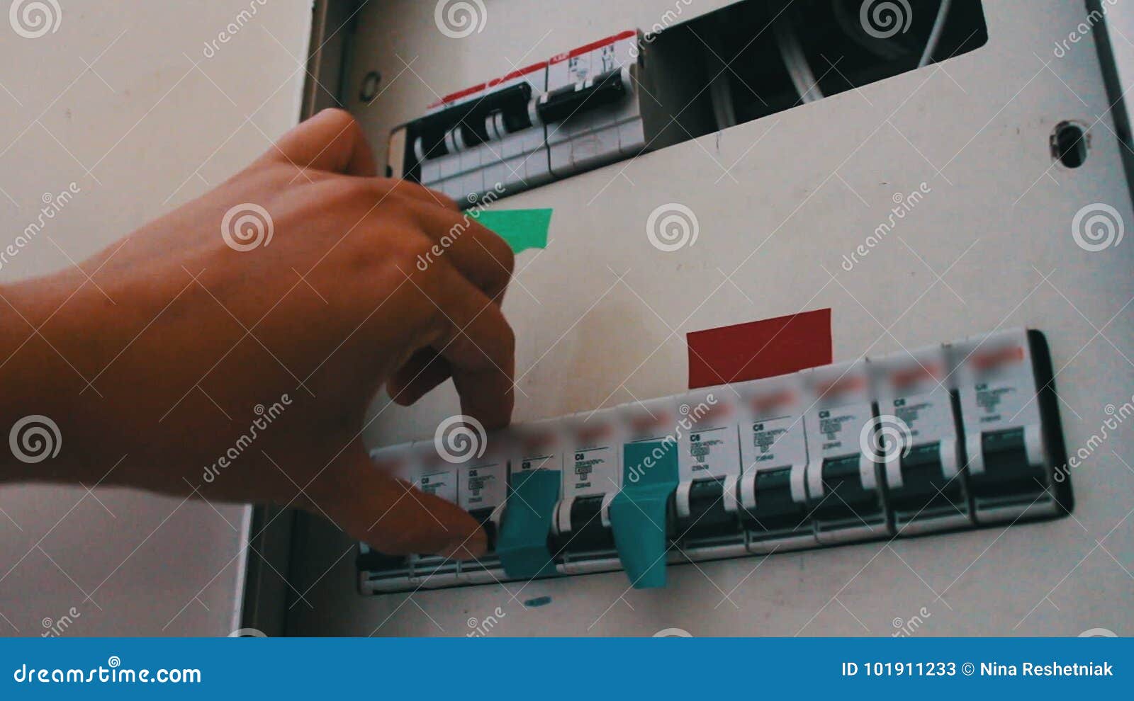 The Female Hand Turns on and Off the Toggle Switch on the Electrical ...