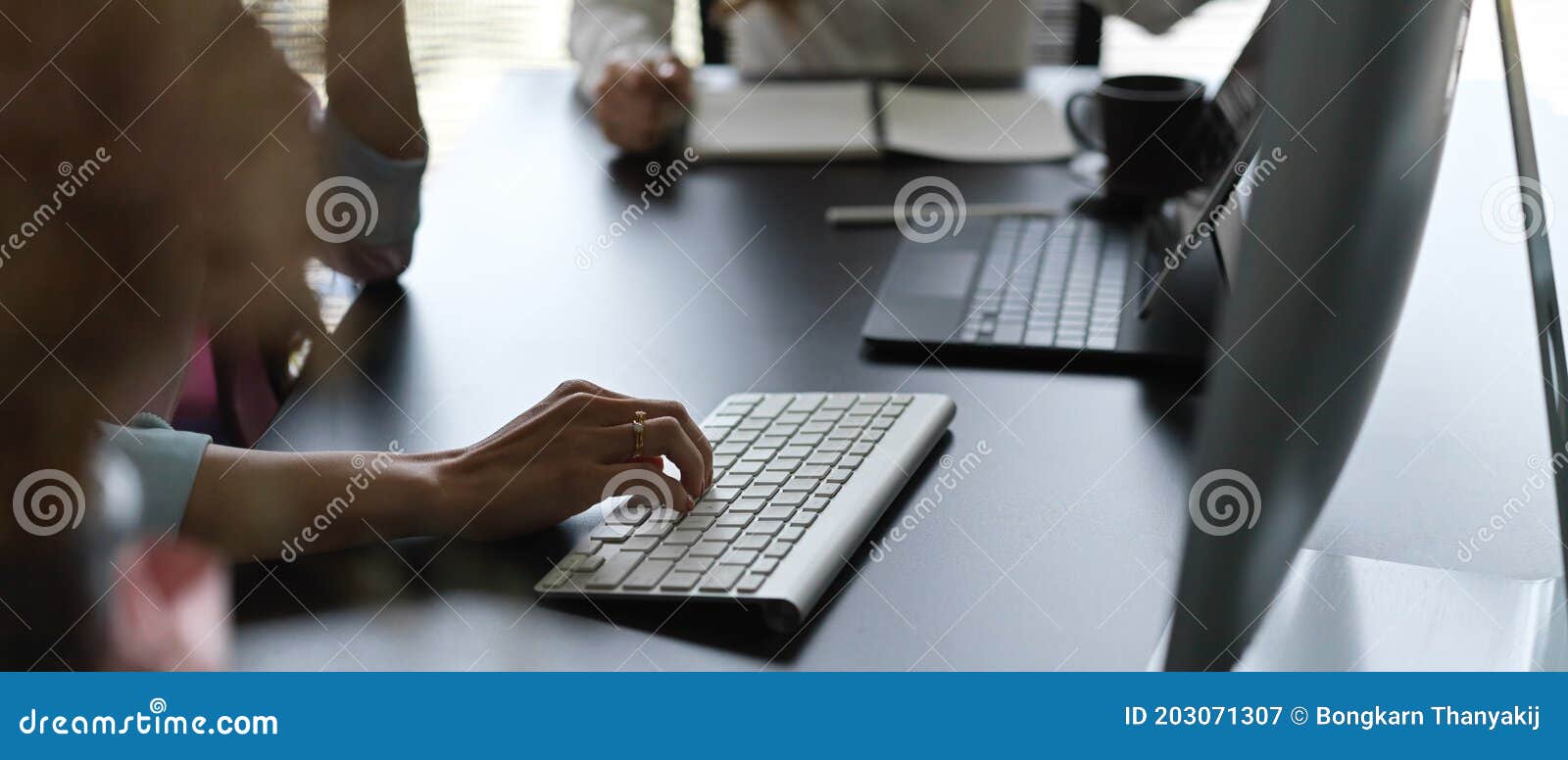 Female Hand Typing on Computer Keyboard on Worktable in Meeting Room ...