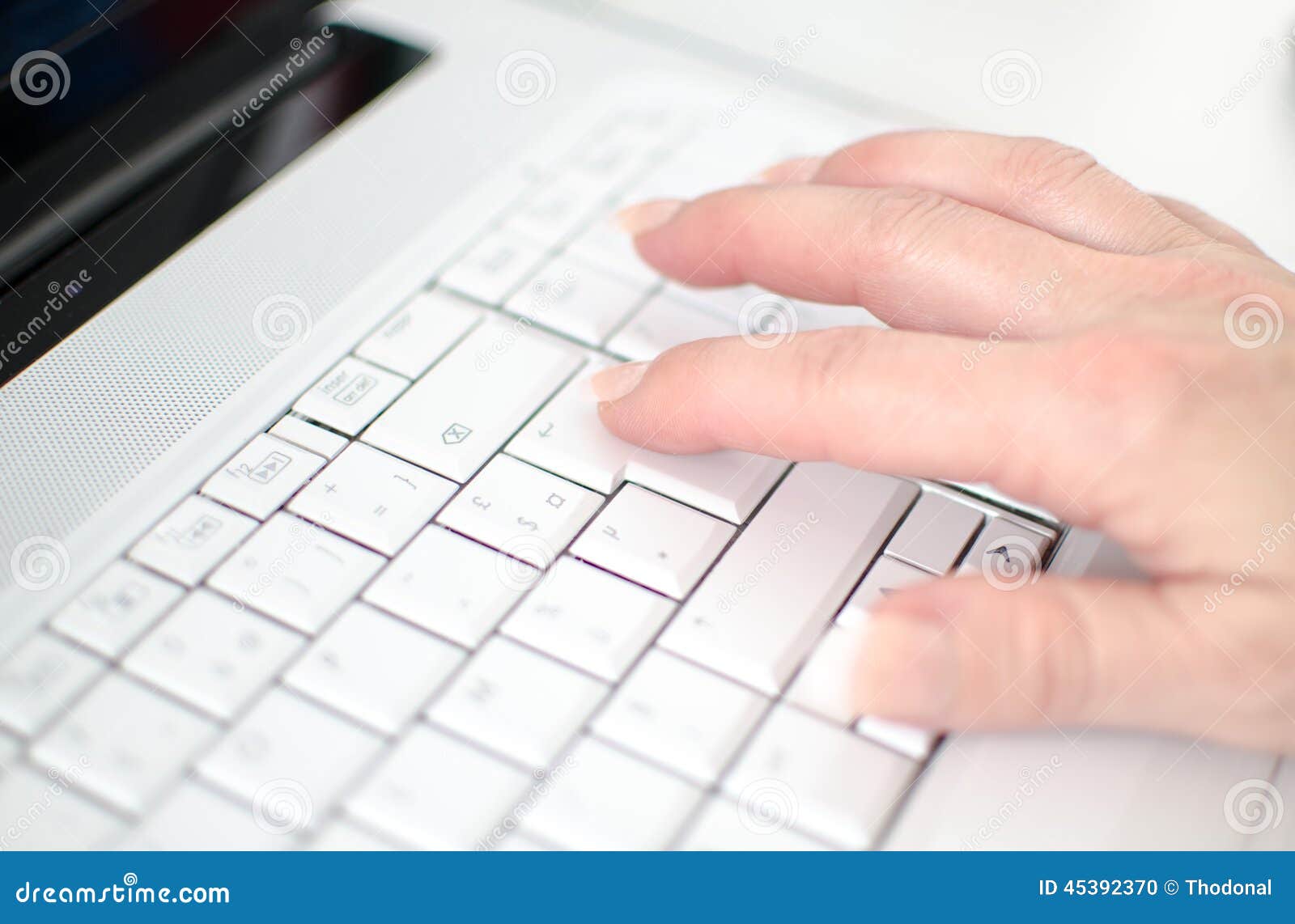 Female Hand Typing on a White Keyboard Stock Photo - Image of finger ...