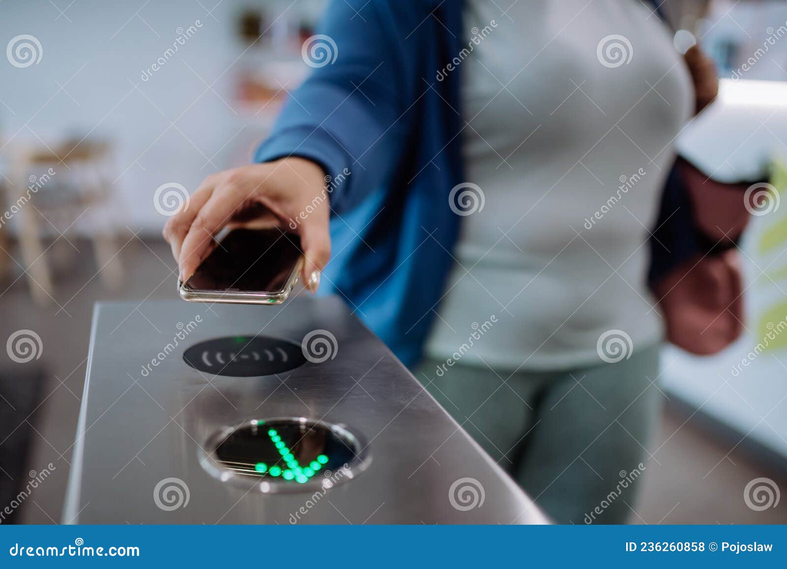 Female Hand Using Smartphone To Open Automatic Gate Machine in Gym ...