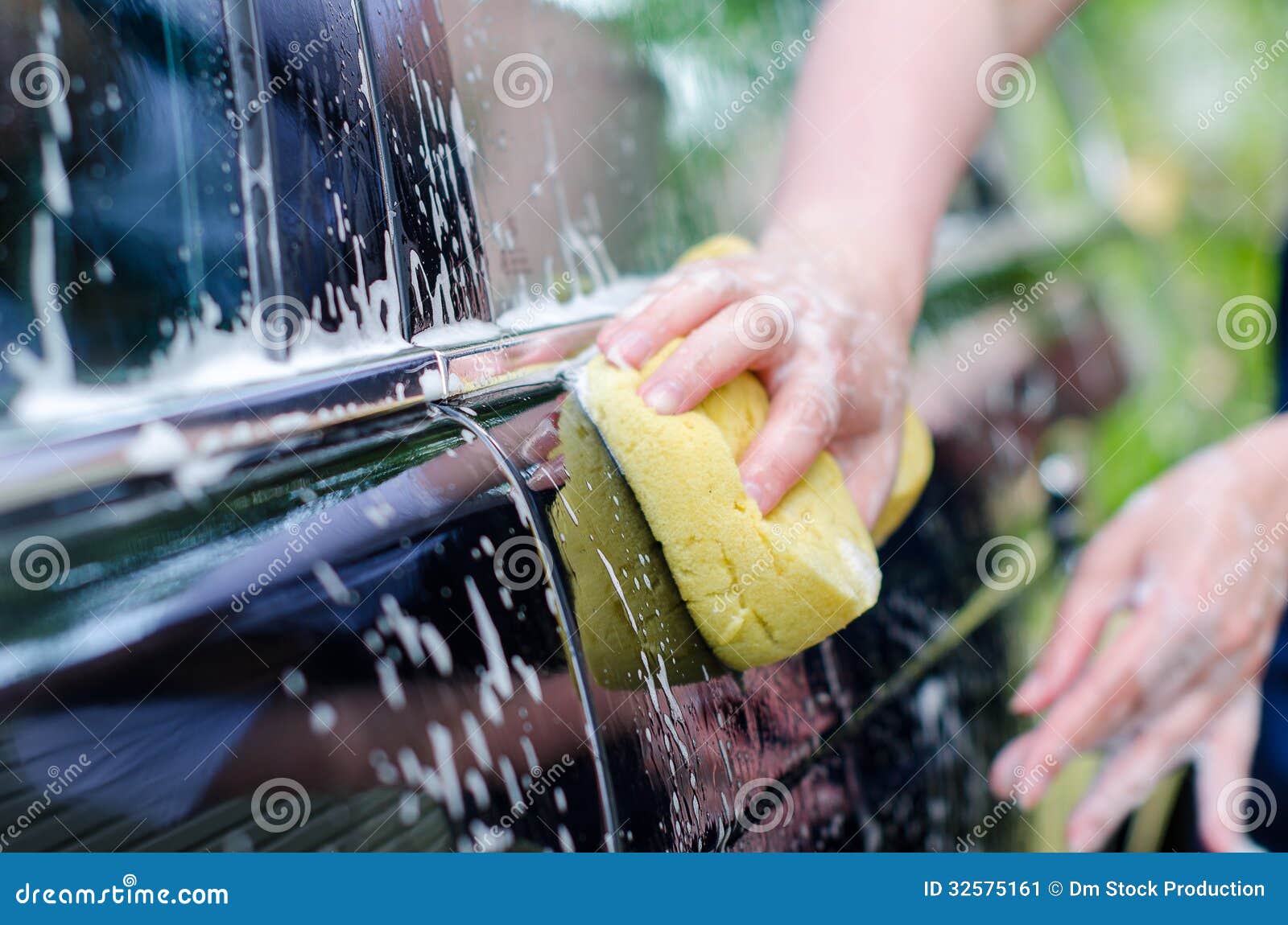Female hand washing car stock image. Image of urban, black - 32575161