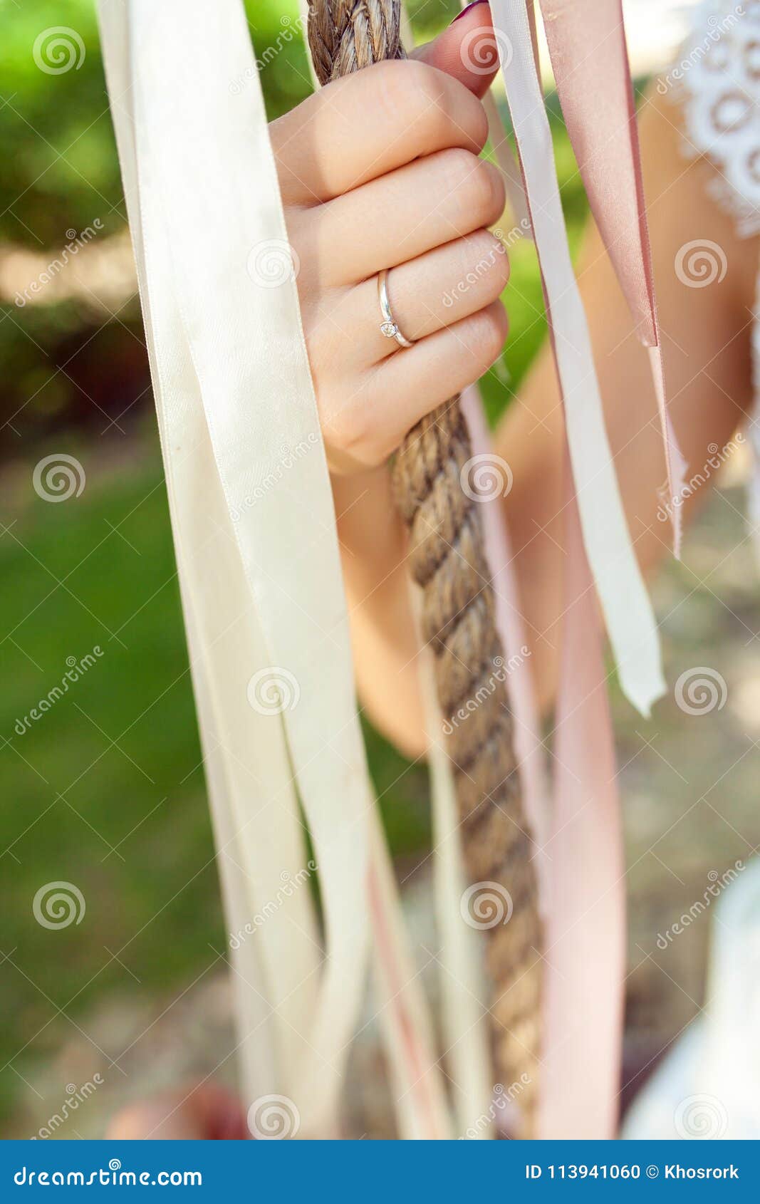 Female Hand with Wedding Ring Holding Rope Stock Photo - Image of ...