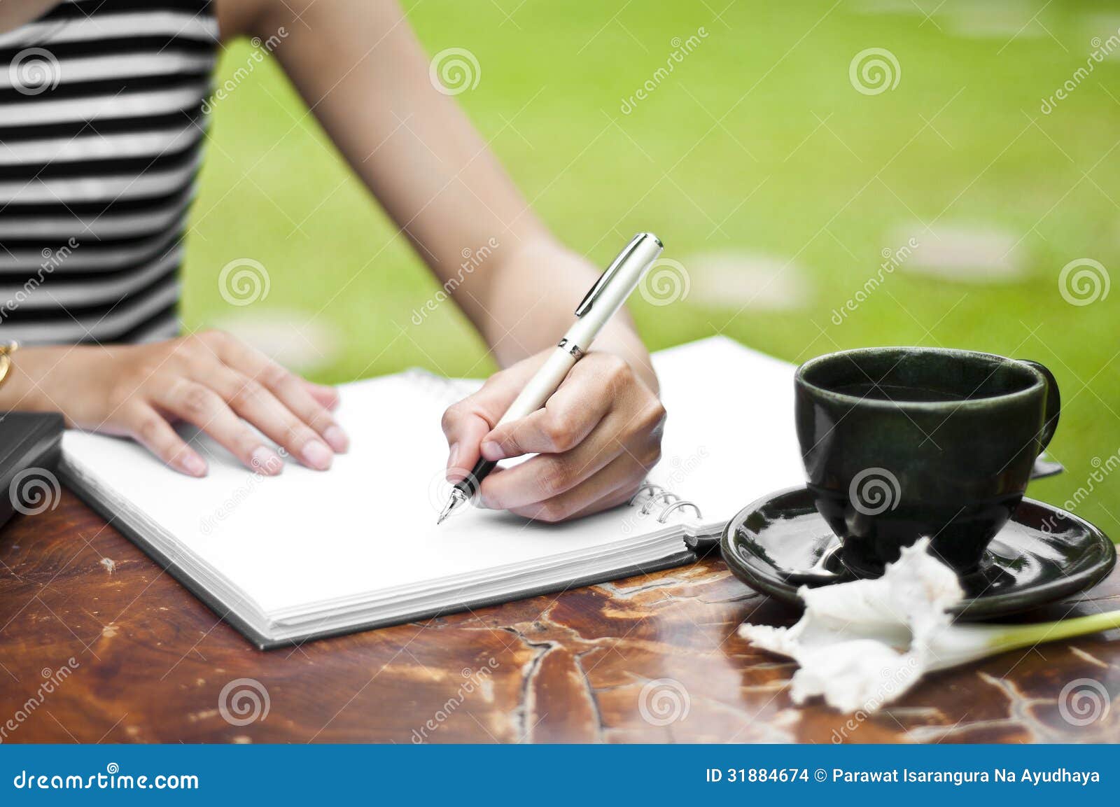 Female hand writing. stock photo. Image of education - 31884674