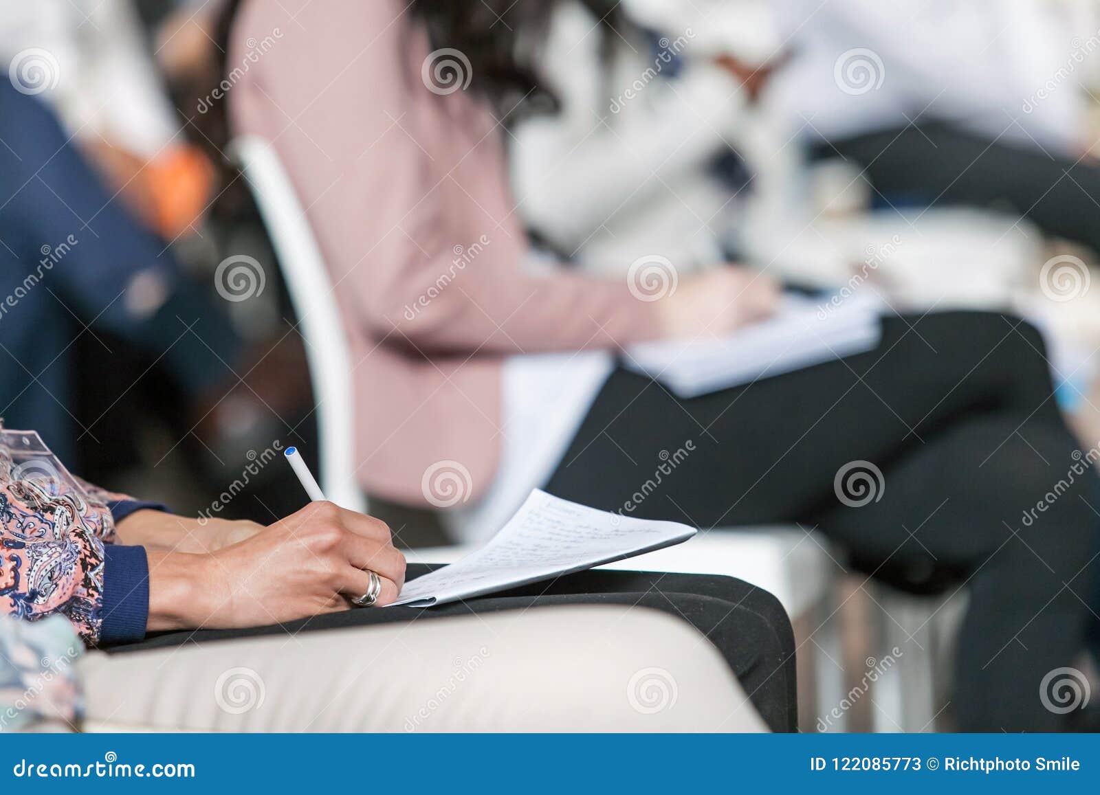 Female Hand Writing Down Notes at a Conference. Stock Image - Image of ...