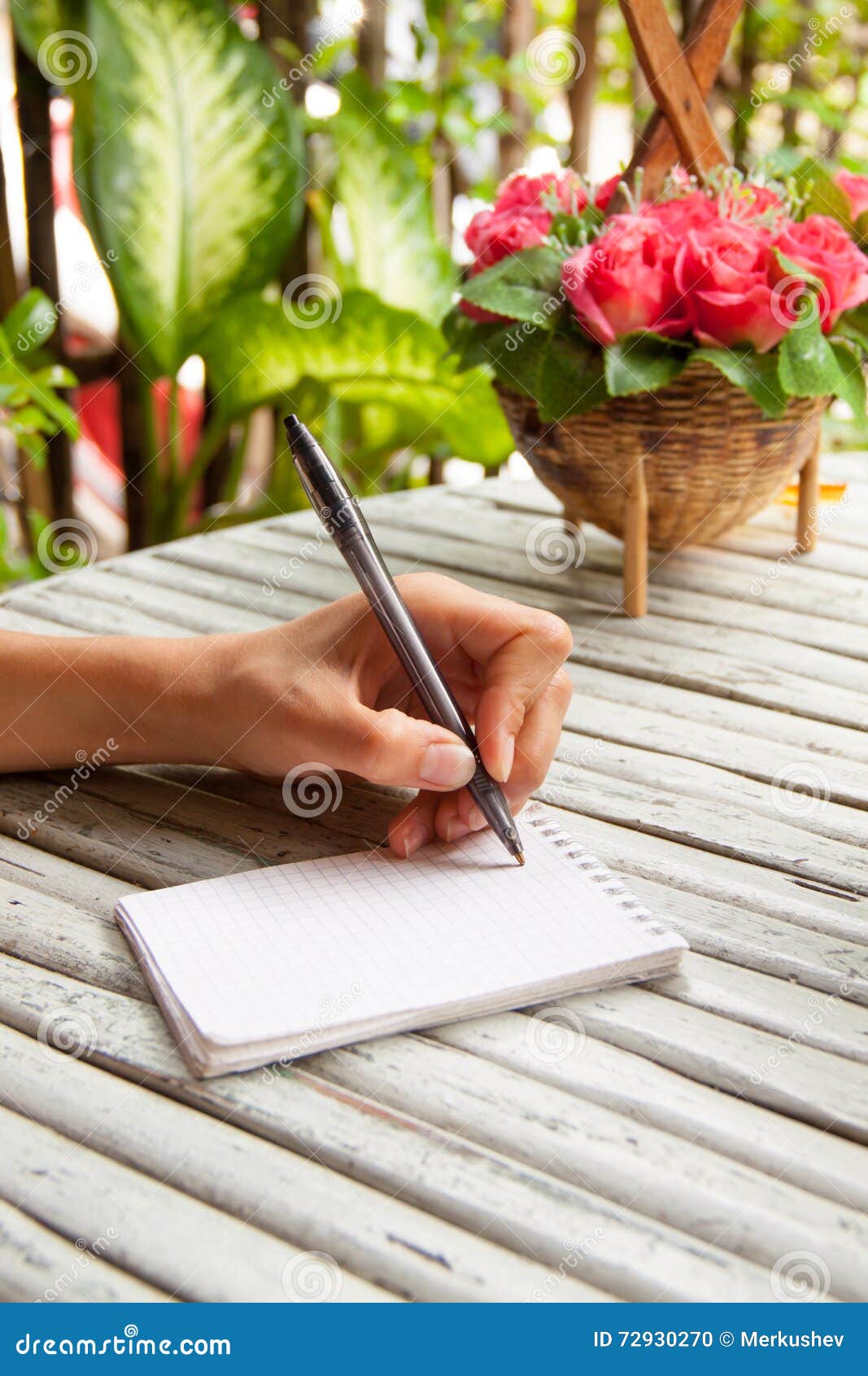 Female Hand Writing in a Notebook on Wooden Table Stock Photo - Image ...