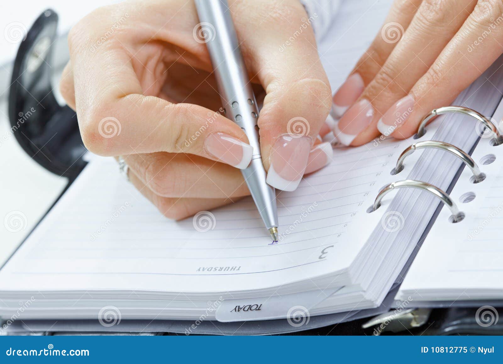 Female hand writing notes stock image. Image of color - 10812775