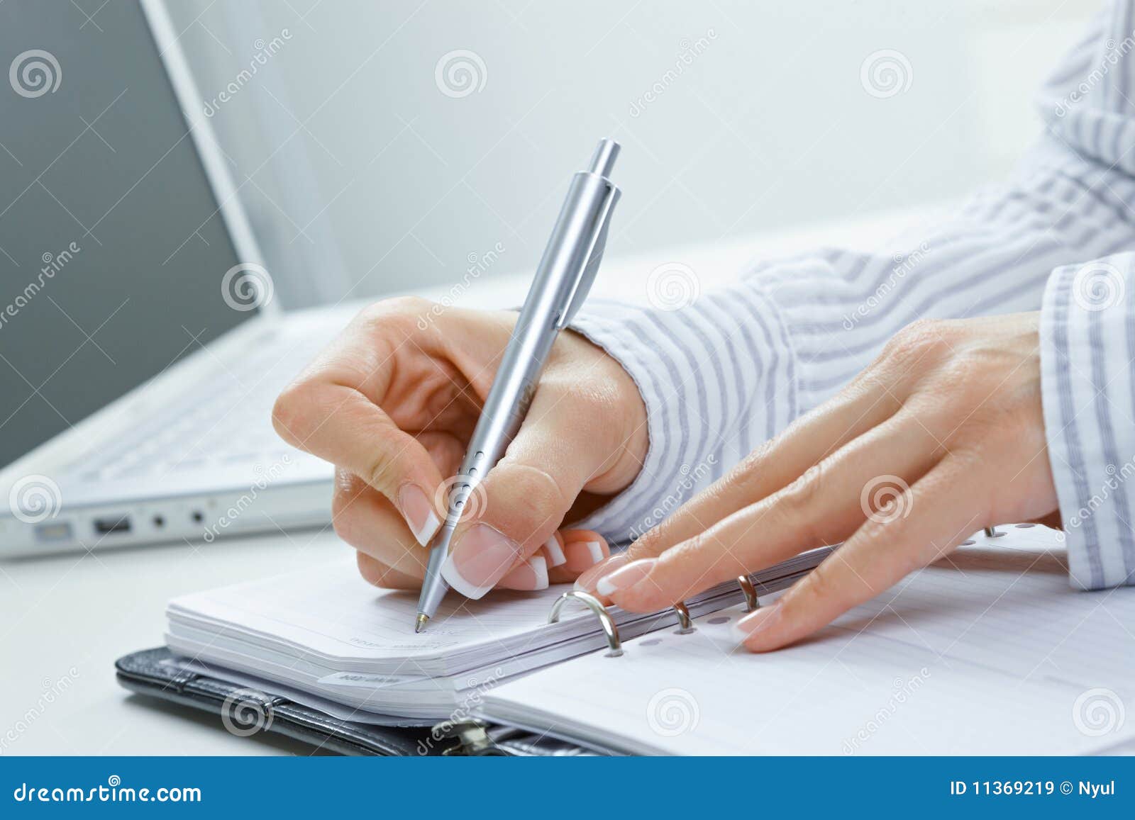 Female hand writing notes stock image. Image of body - 11369219