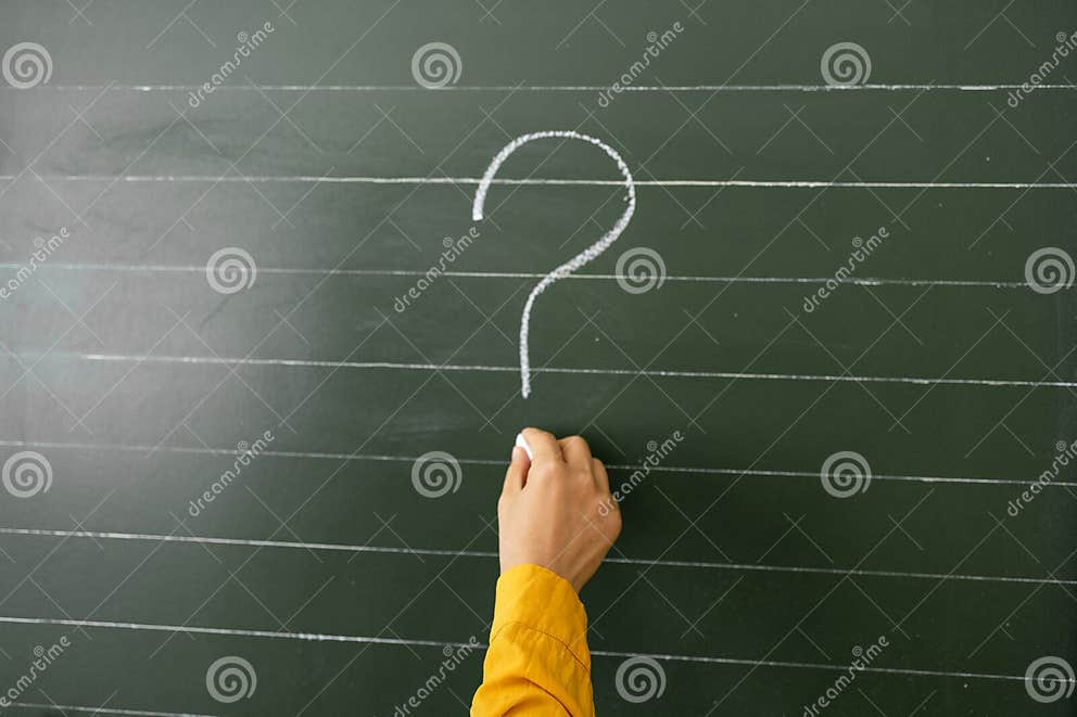 Hand Writing Question Marks on the Background of Boards. Stock Photo ...