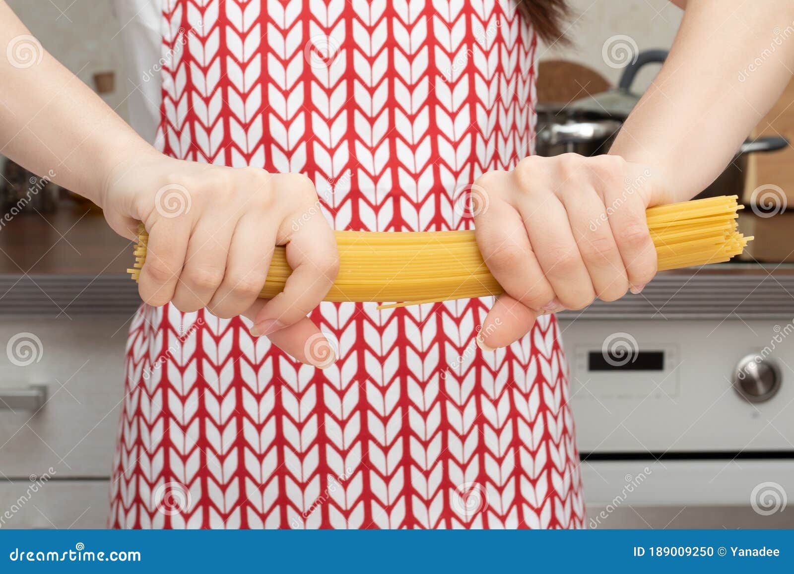 Female Hands Break Spaghetti into Pieces Stock Photo - Image of noodles ...